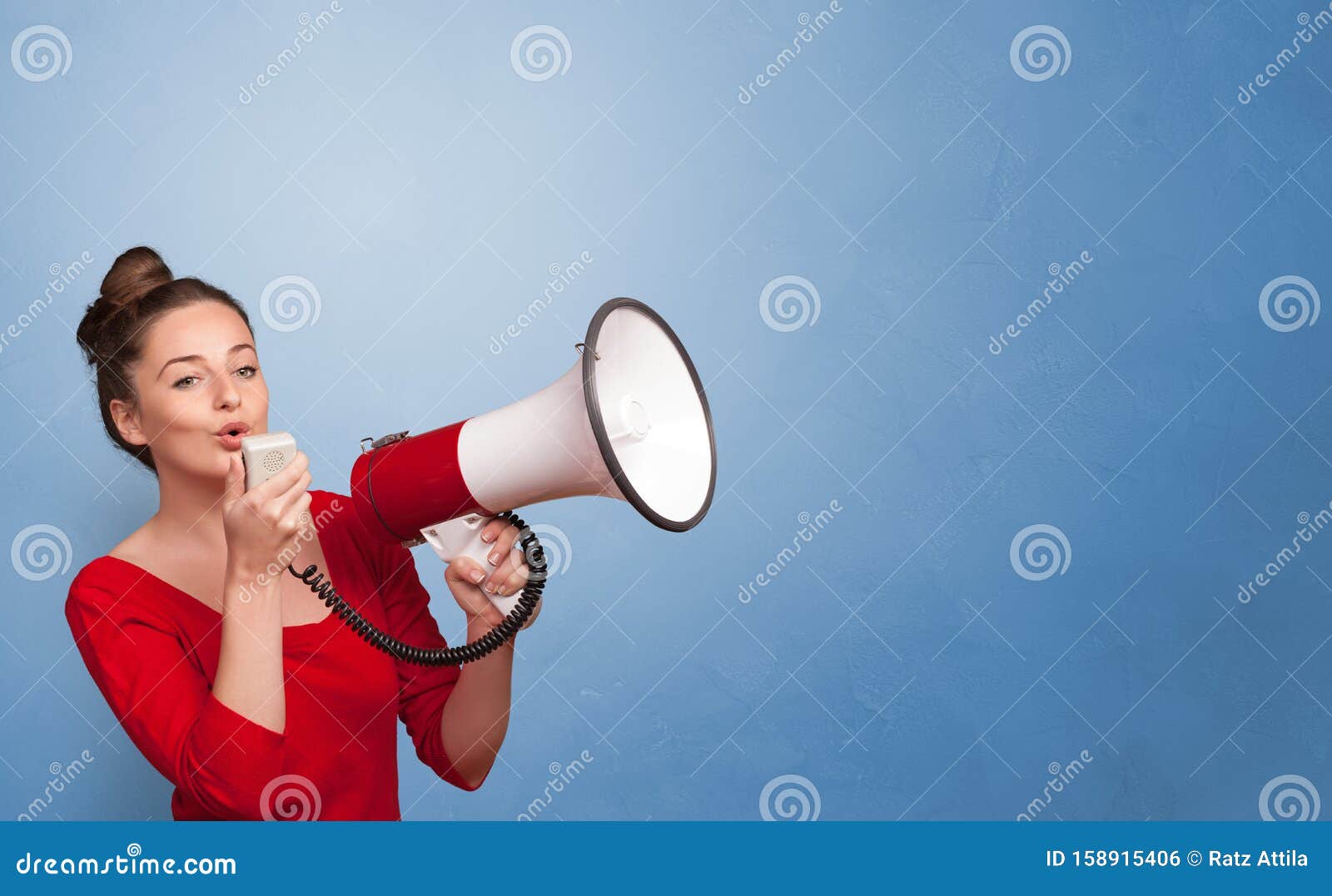 Person holding megaphone stock photo. Image of blue - 158915406