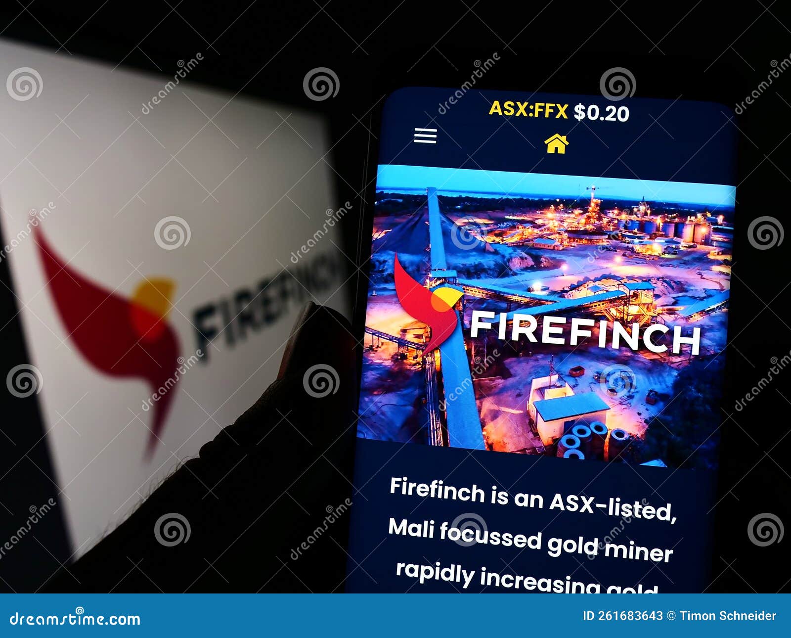 Person Holding Mobile Phone with Website of Australian Gold Mining ... Person Holding Mobile Phone with Website of Australian Gold Mining ...