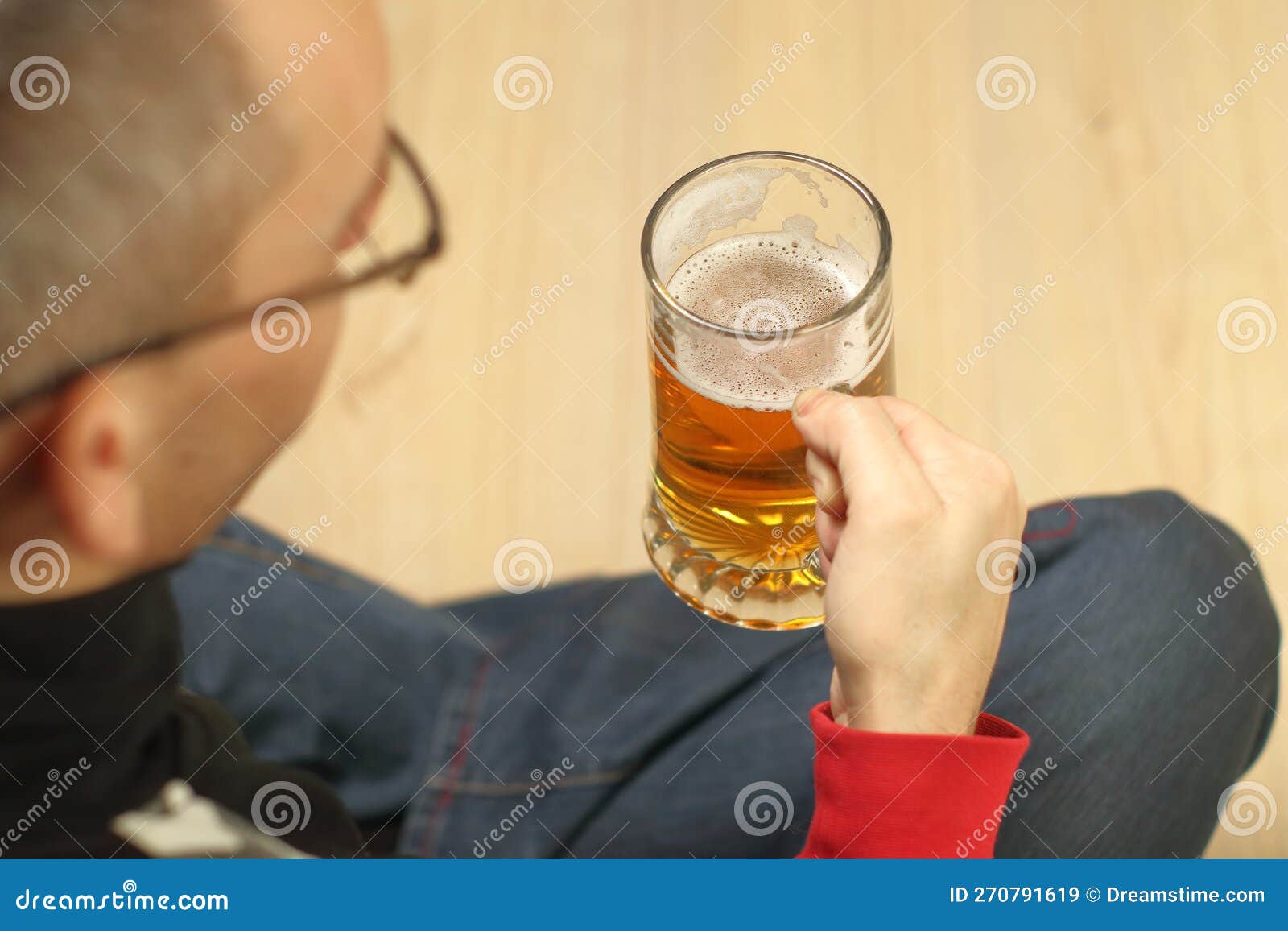 Person Holding a Mug of Beer in Front of Him Stock Image - Image of ...