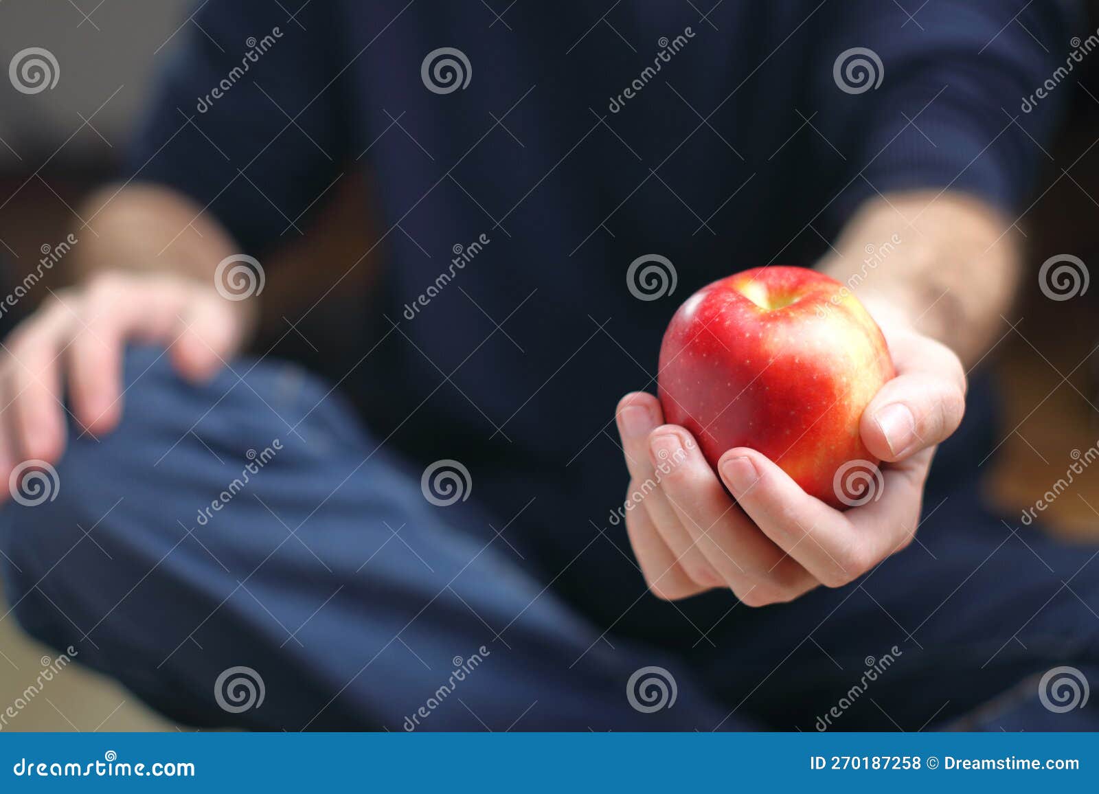 Person holding a red apple stock photo. Image of fruit - 270187258