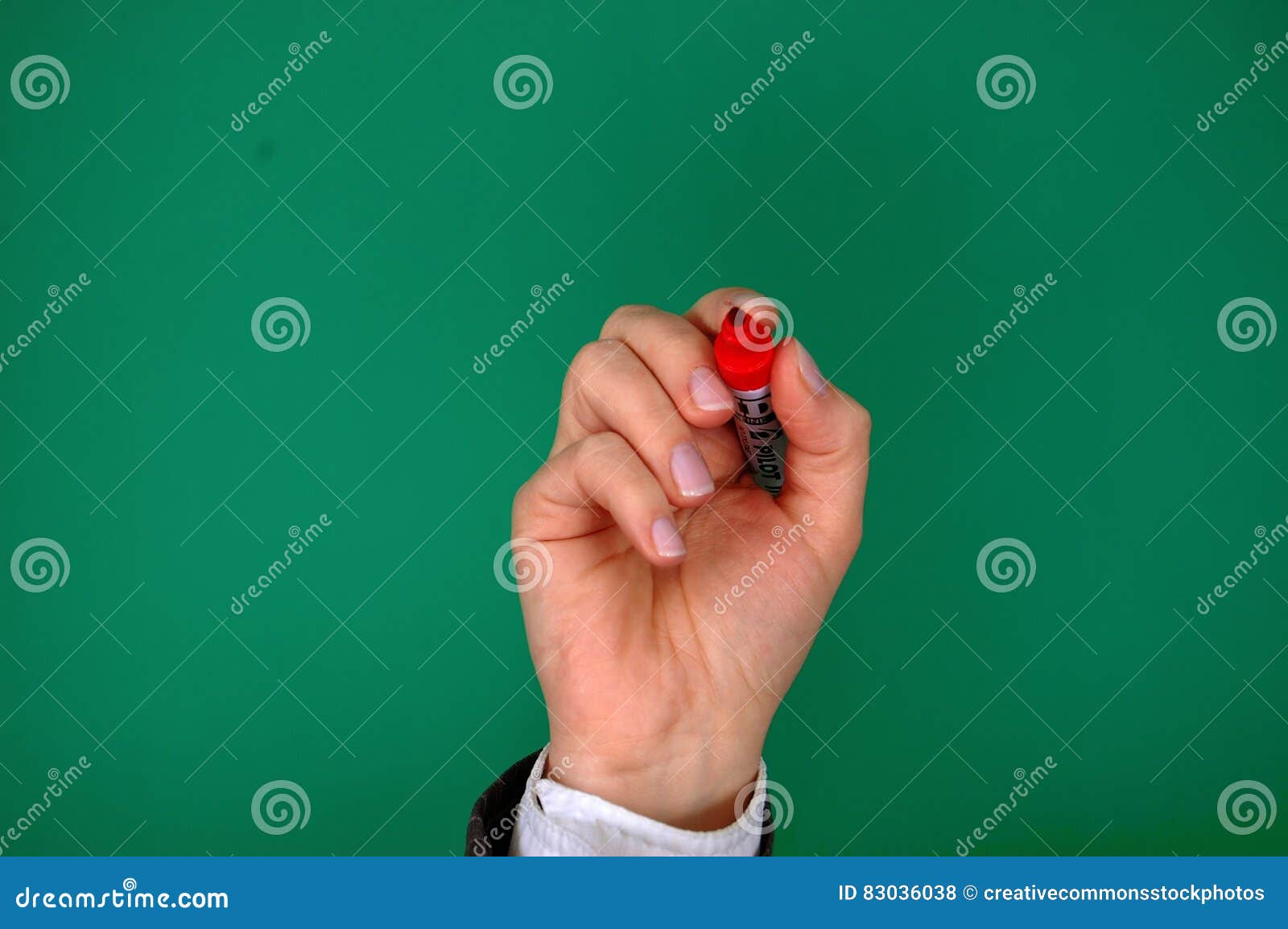 Person Holding Red Marker Picture. Image: 83036038