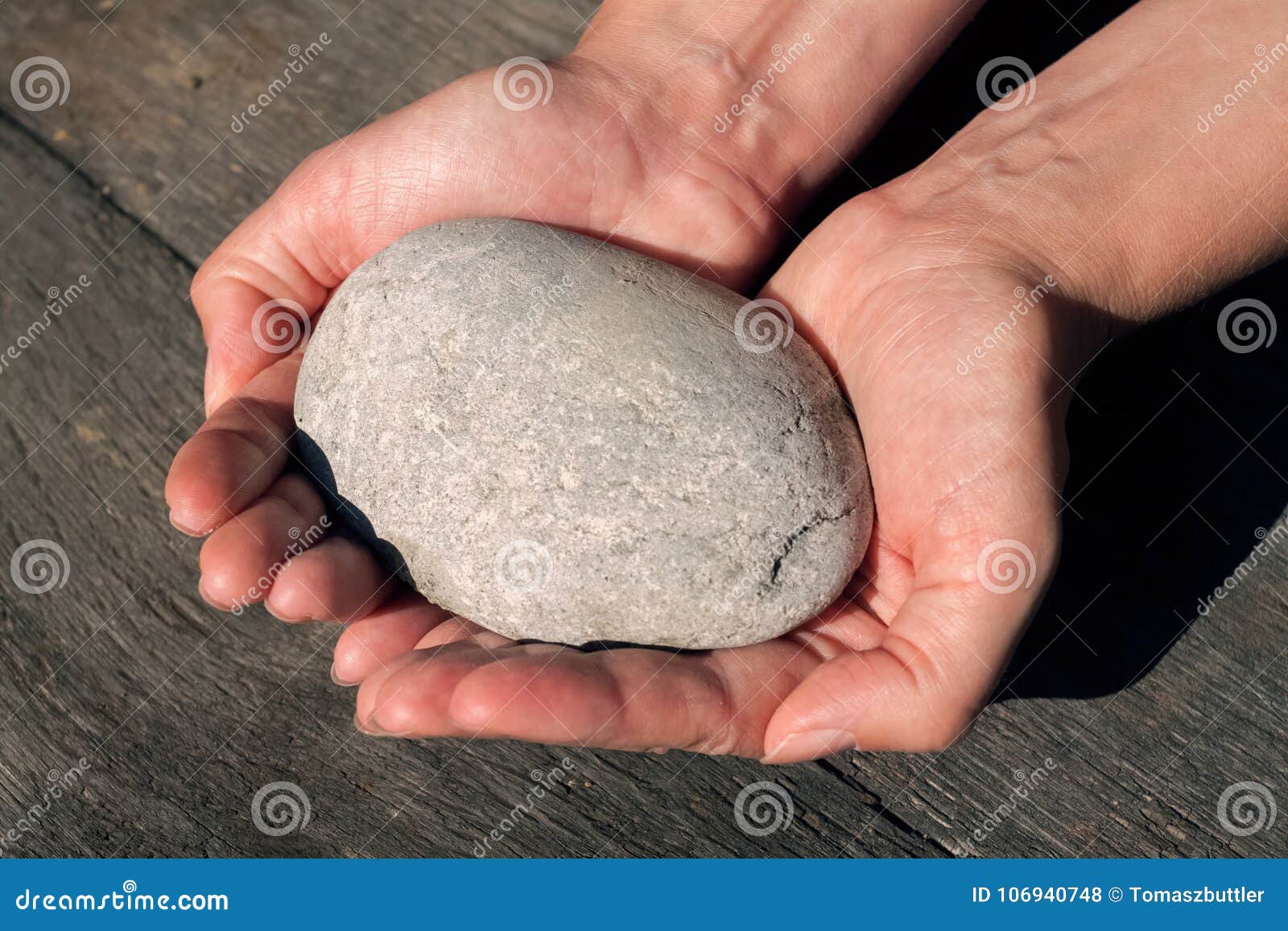 A Person Holding a Stone in Her Hands Close Up Stock Photo - Image of ...