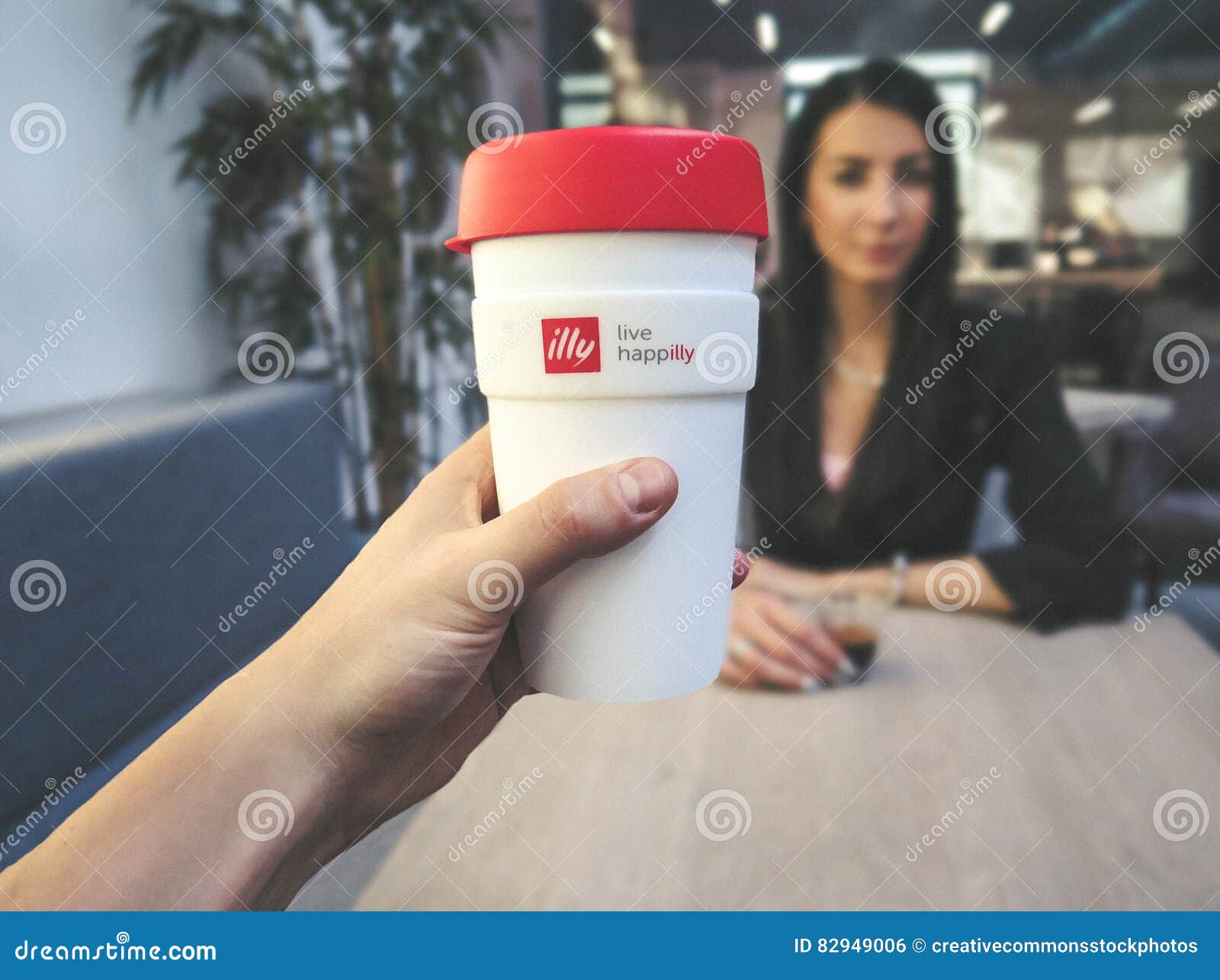 Person Holding White And Red Live Happilly Cup Picture. Image: 82949006