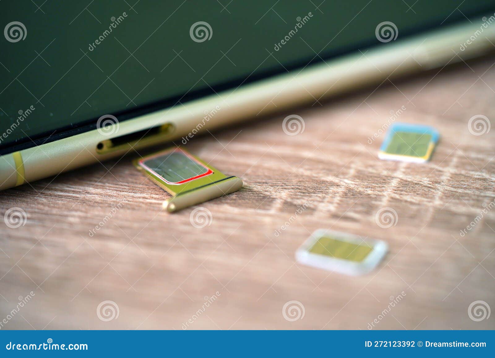 Person Inserting a Sim Card into Back of Mobile Phone, Sim Card in Tray ...