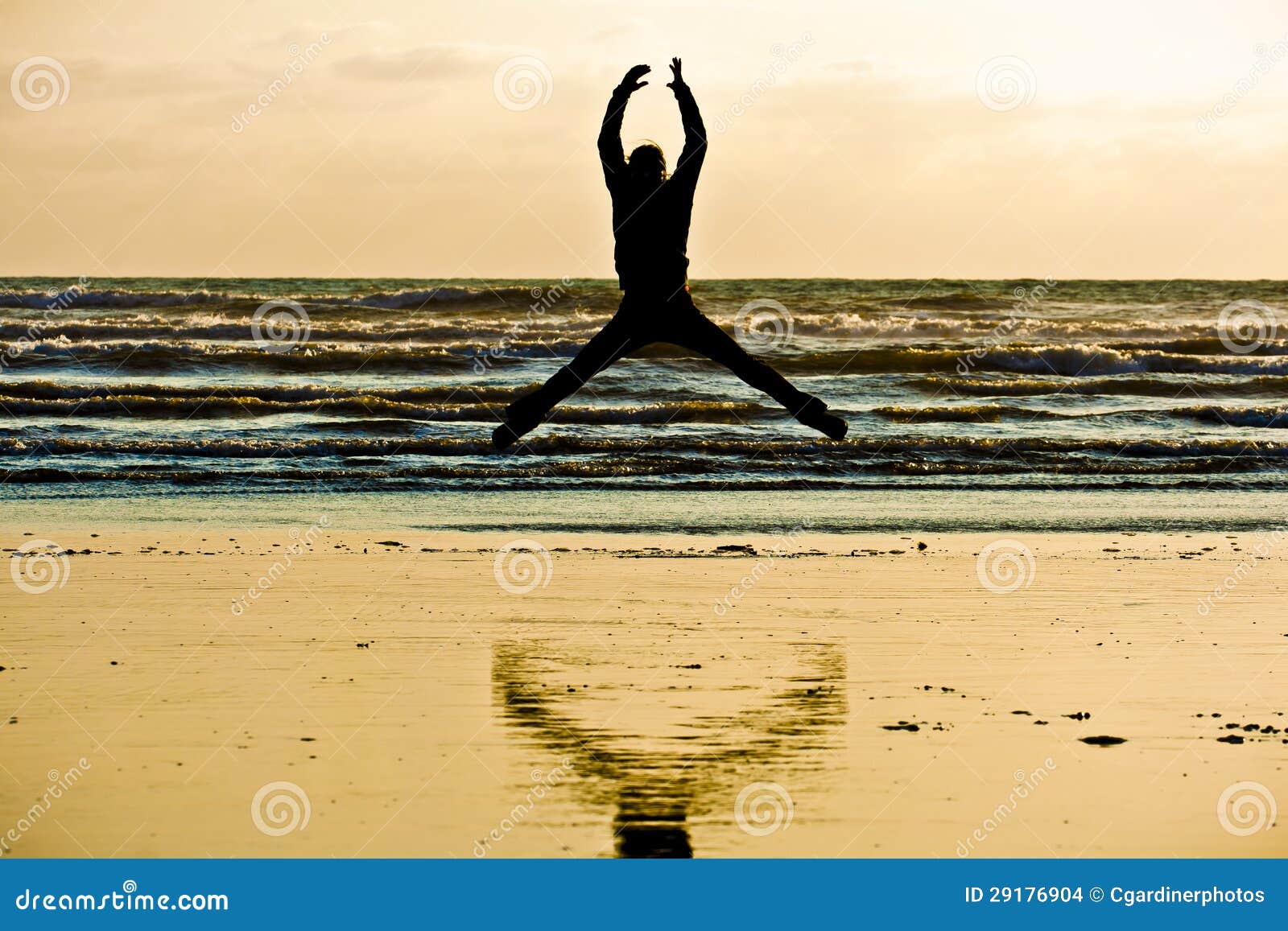 Person Jumping by the Sea Shore Stock Photo - Image of ocean, jump ...