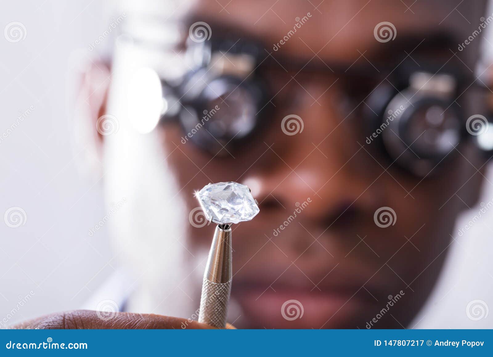 Person Looking at Diamond with Magnifying Loupe Stock Image - Image of ...