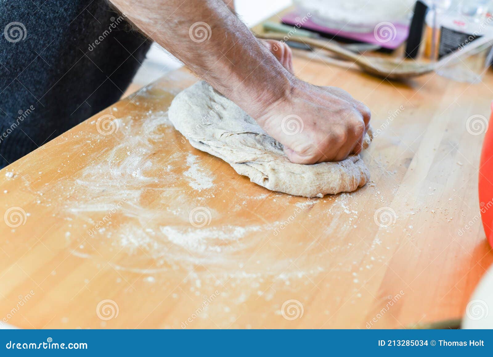 Person Making Bread in a Home Kitchen Adding Ingredients To Make the ...