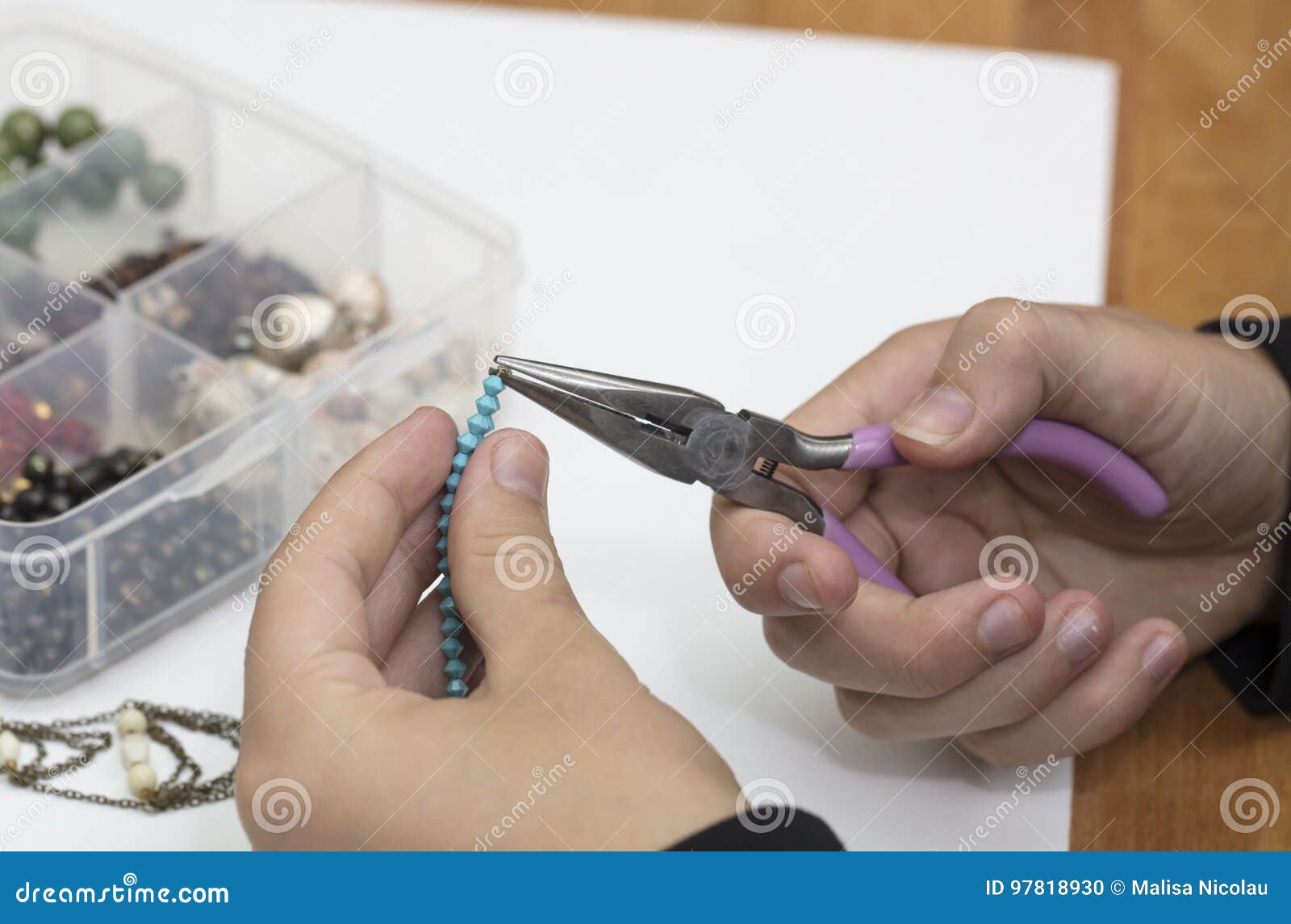 Person Making Jewelry with Beads and Other Materials with Tools Stock ...