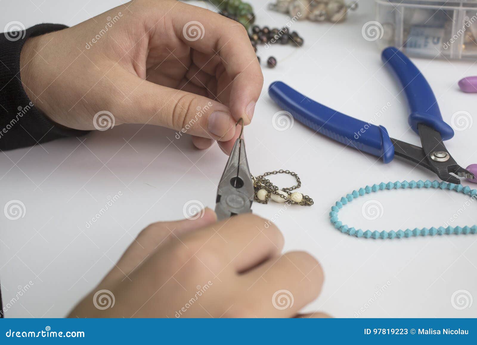 Person Making Jewelry with Beads and Other Materials with Tools Stock ...