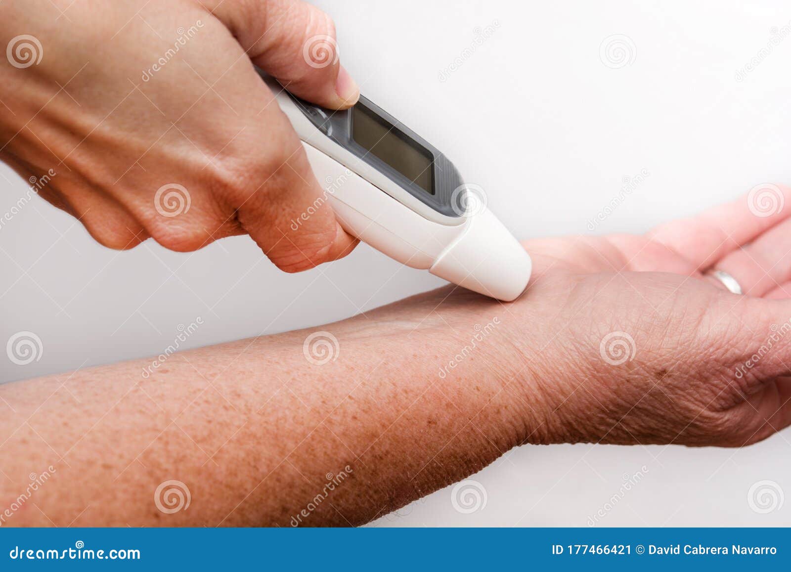 Person Measuring Temperature with Thermometer in Wrist Stock Image ...