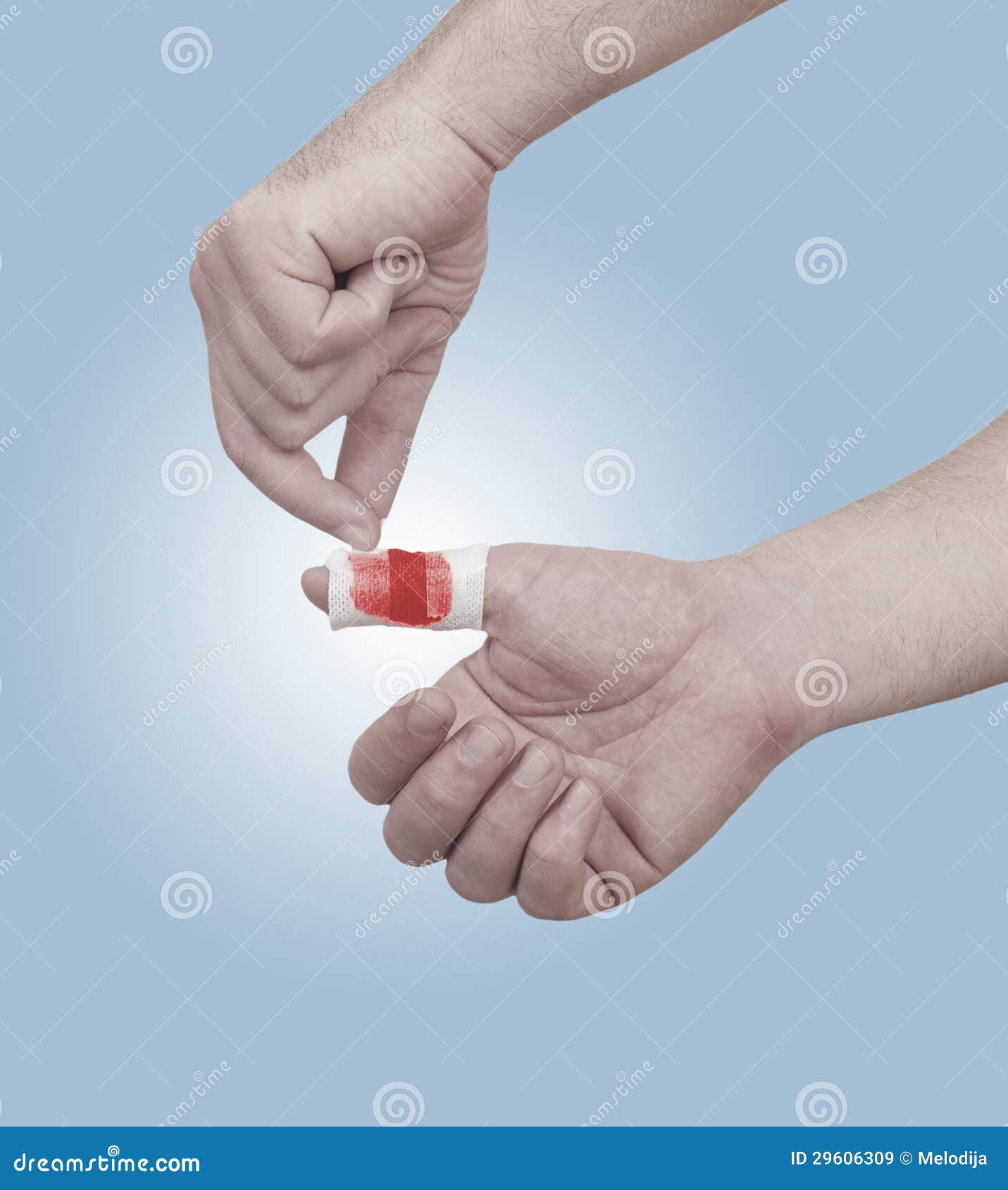 A Person Medically Dressed with a Cotton Ball and Bandage Over a Stock ...