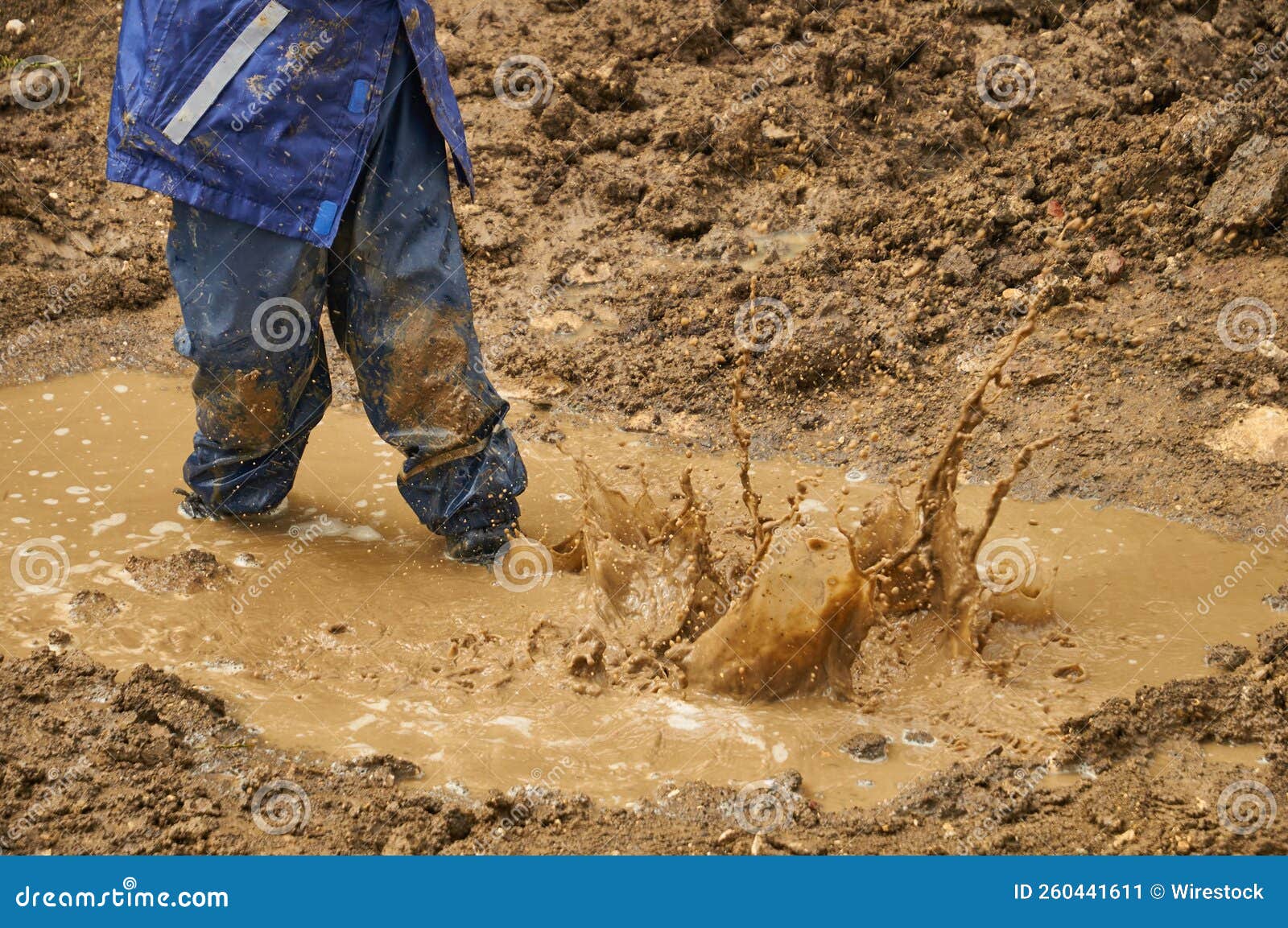 Person on Muddy Ground after the Rain Stock Image - Image of muddy ...