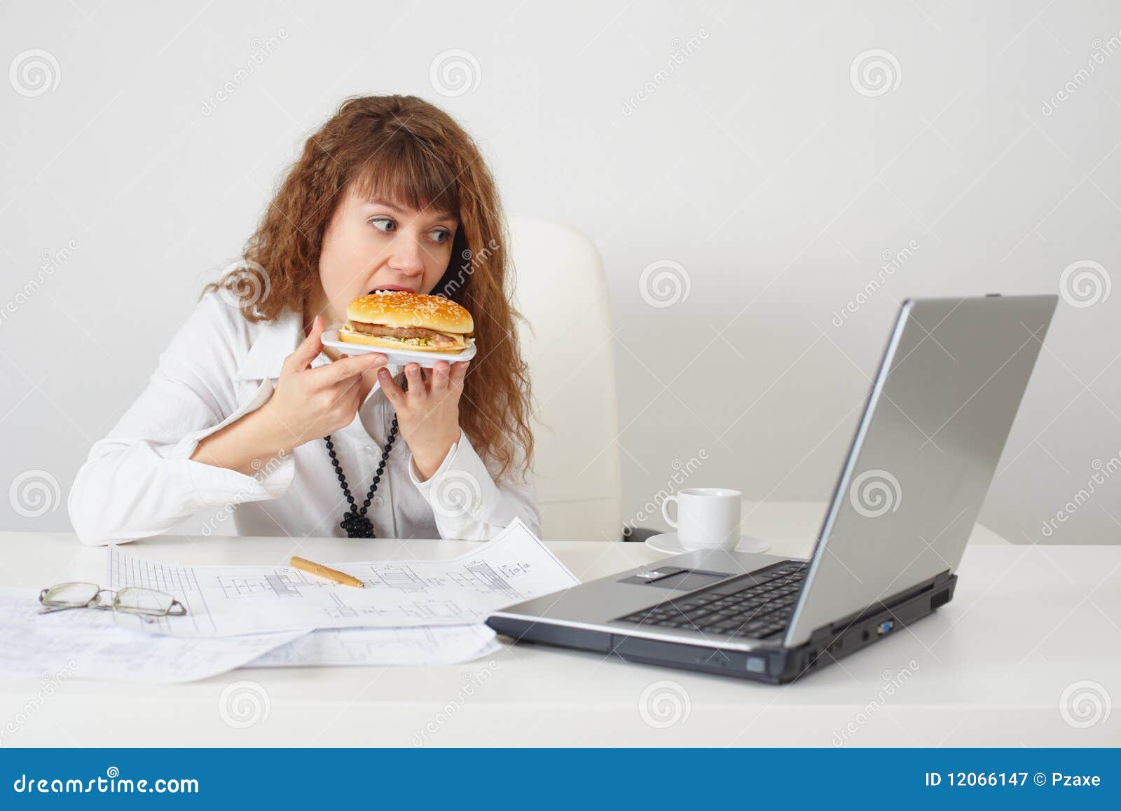 Person at Office on Workplace Eats a Hamburger Stock Image - Image of ...