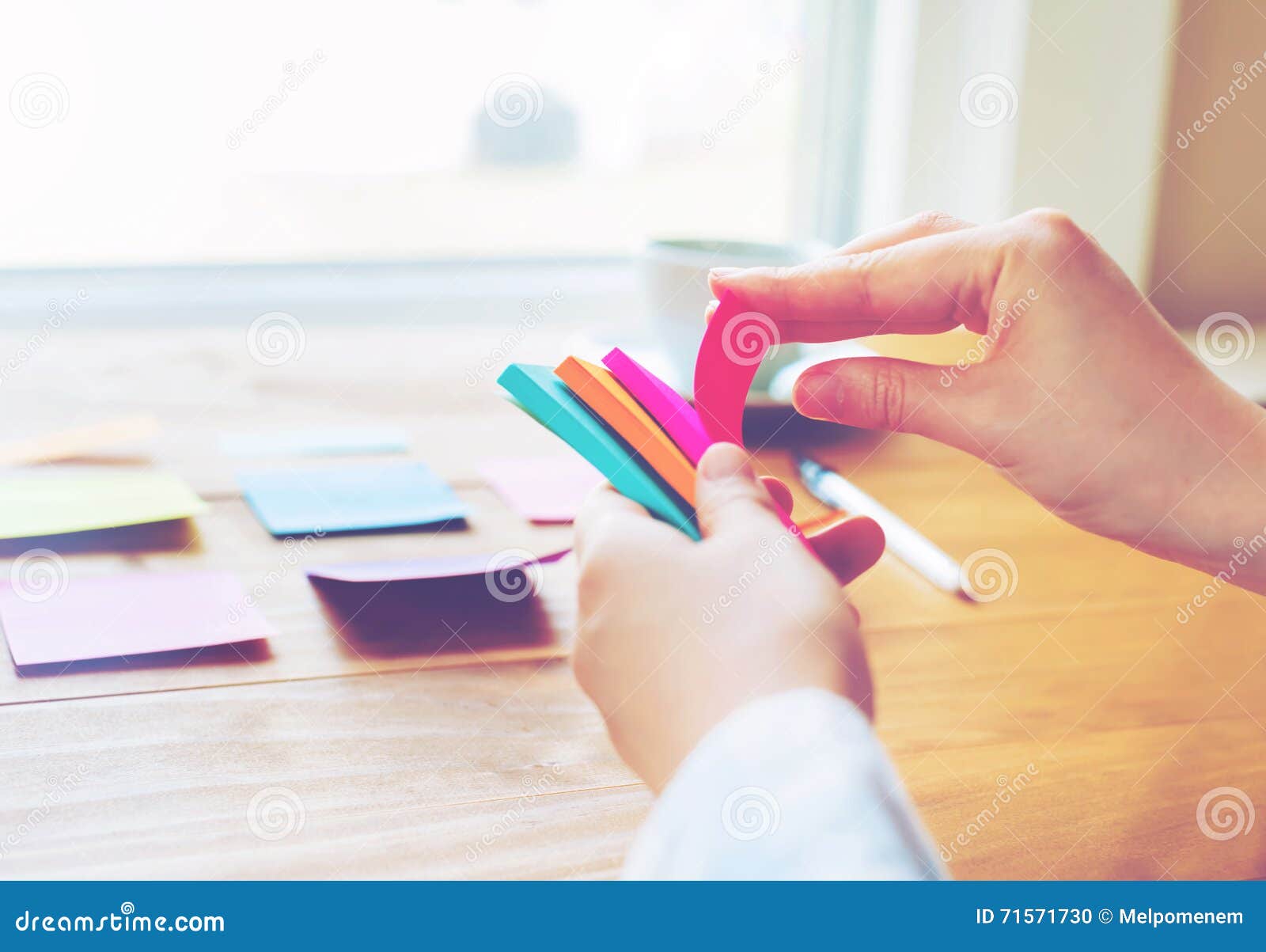 Person Organizing Things at a Desk Stock Photo - Image of table ...