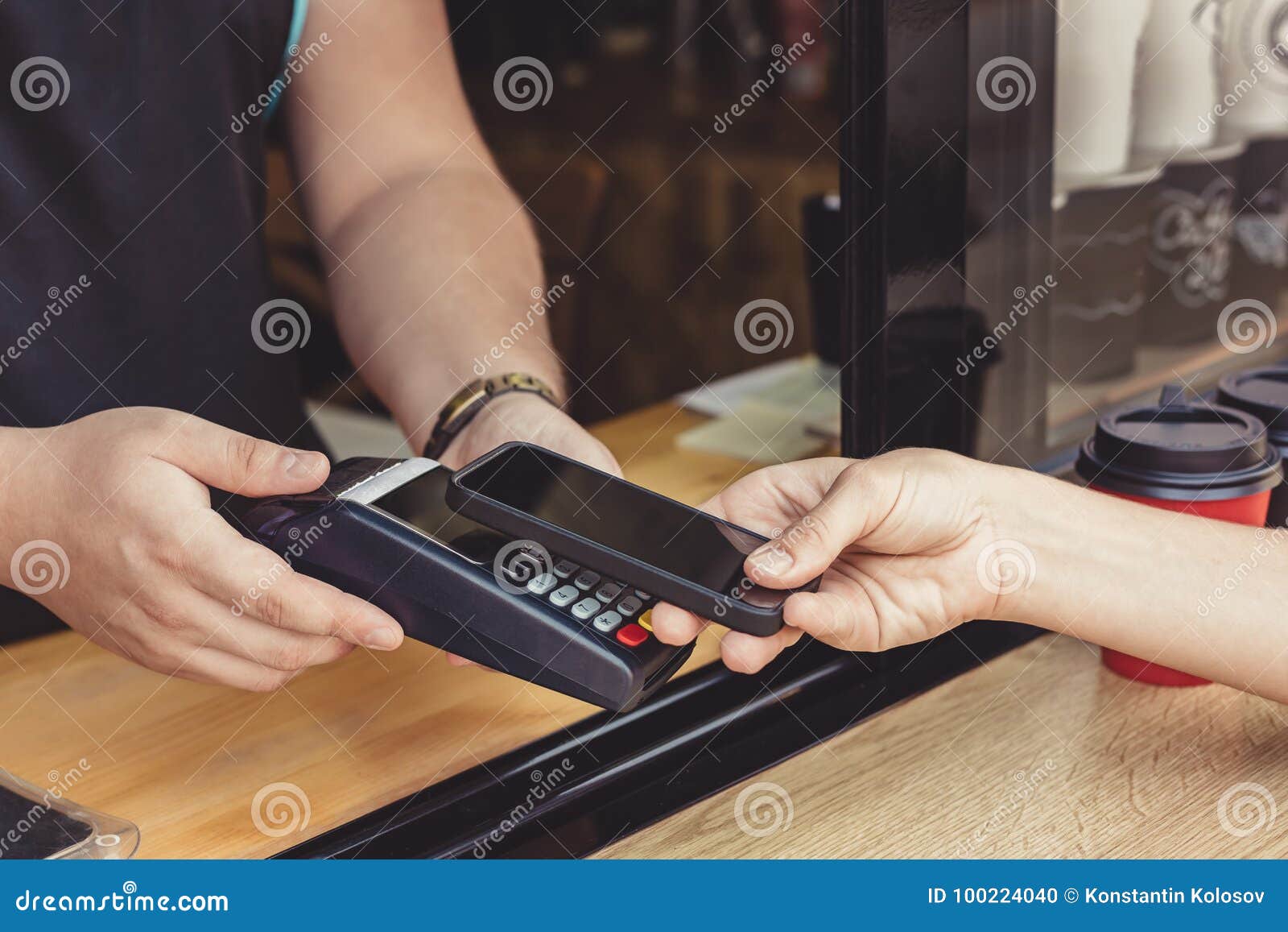 Person Paying Pay through Smartphone Using NFC Stock Photo - Image of ...