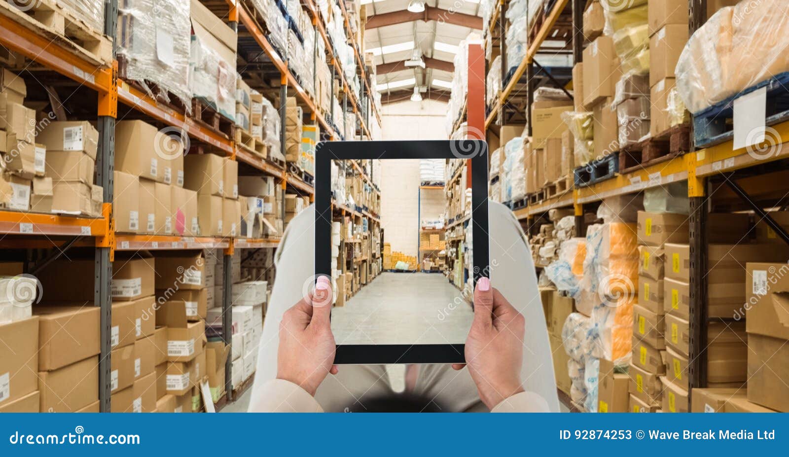Person Photographing Warehouse through Tablet PC Stock Image - Image of ...