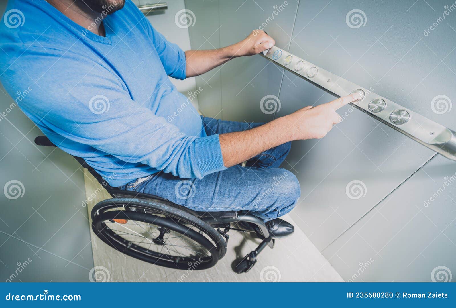 Person with a Physical Disability in a Wheelchair Using Lift in ...
