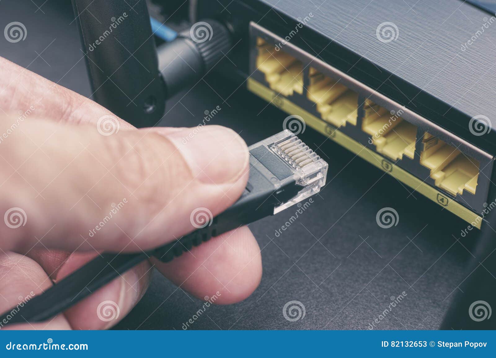 Person Plugging in Cable To Wireless Router Stock Image - Image of rj45 ...