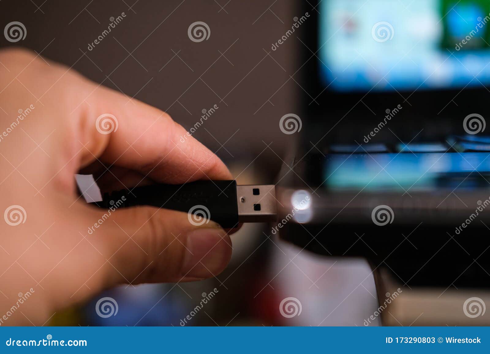 Person Plugging a USB Cable into the Port of a Laptop Stock Image ...