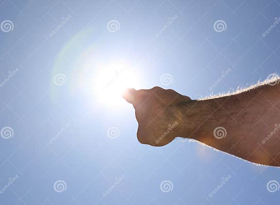 Person pointing at the sun stock image. Image of flares - 19922929