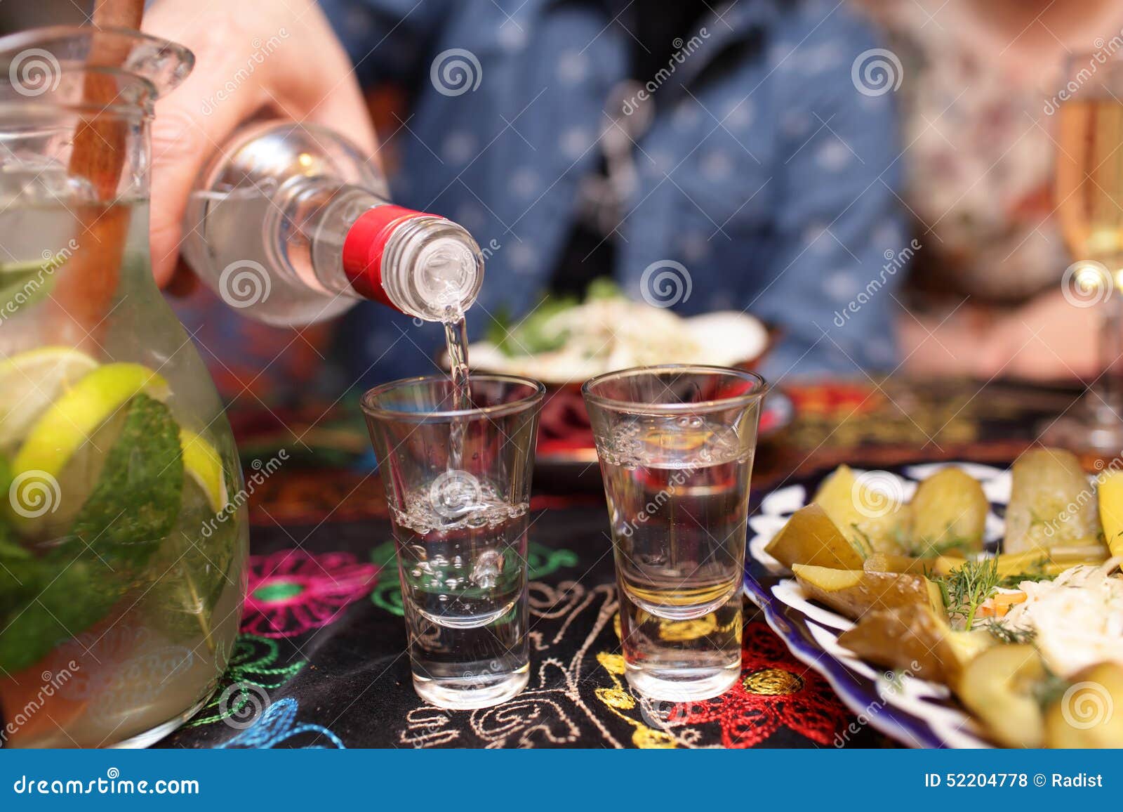 Person pouring vodka stock photo. Image of pickle, appetizer - 52204778