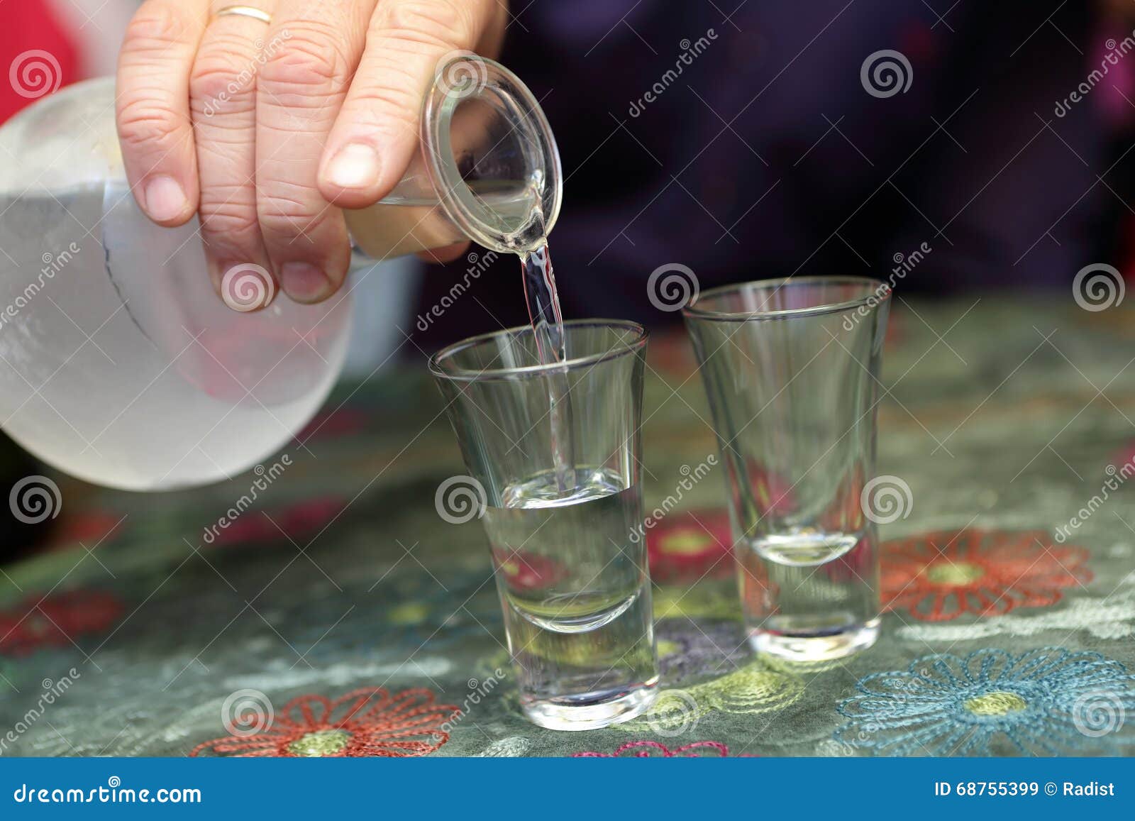 Person pouring vodka stock image. Image of cool, celebrate - 68755399