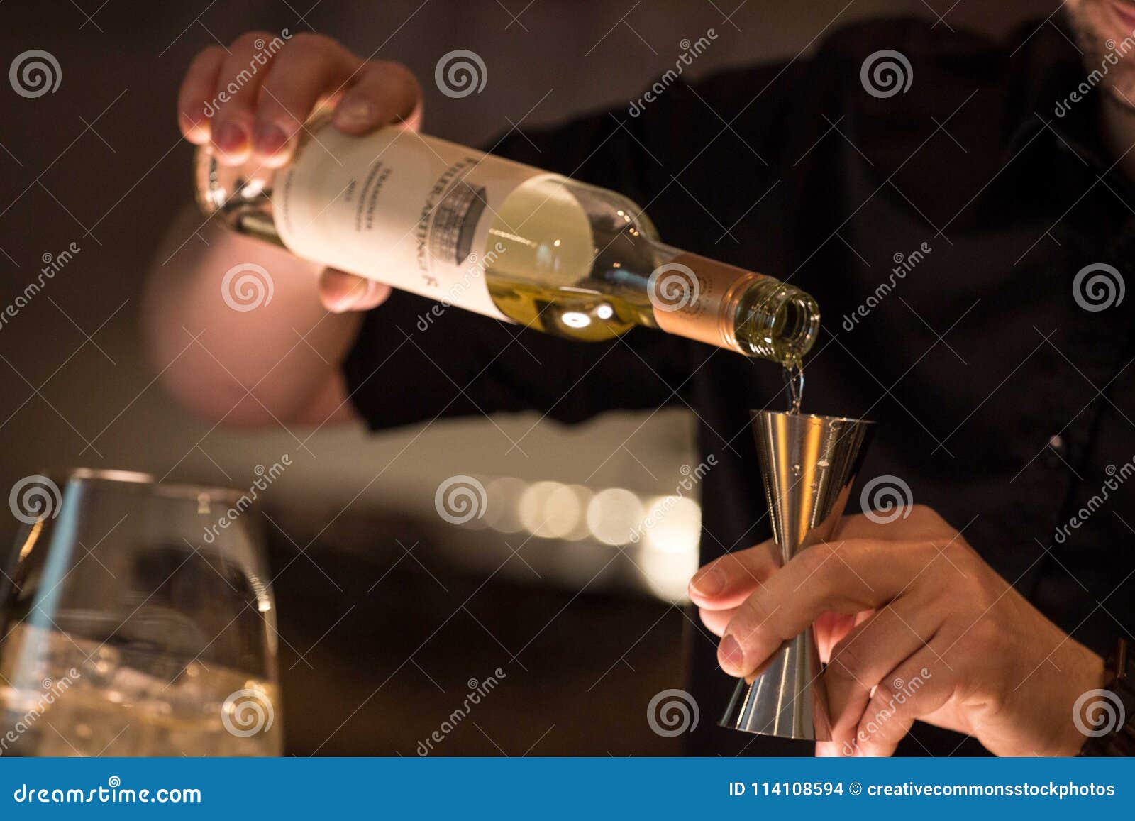 Person Pouring Wine On Grey Jigger Picture. Image: 114108594