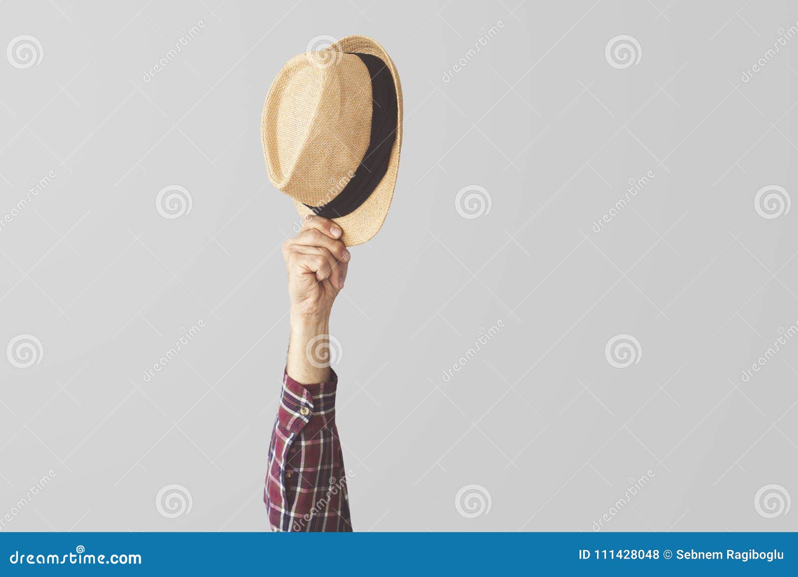Person Raised Up Hand Holding Hat Stock Photo - Image of hold, tour ...