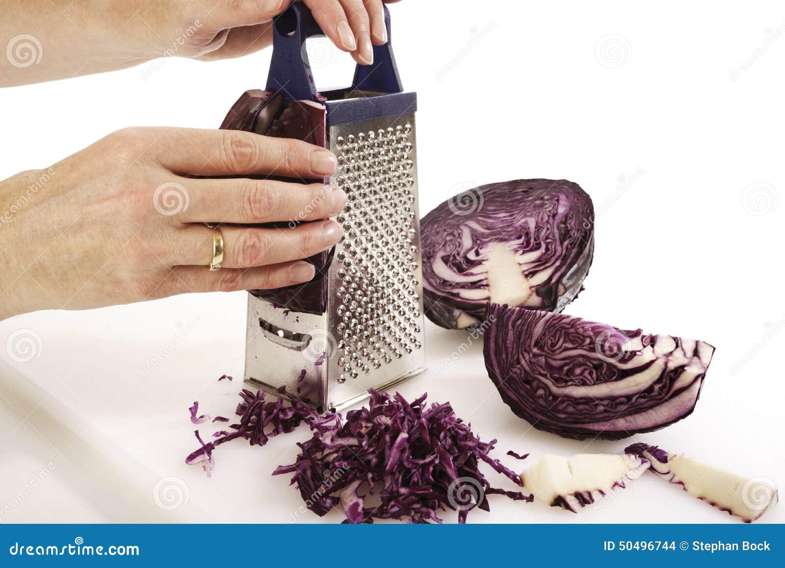Person rasping red cabbage stock photo. Image of plant - 50496744