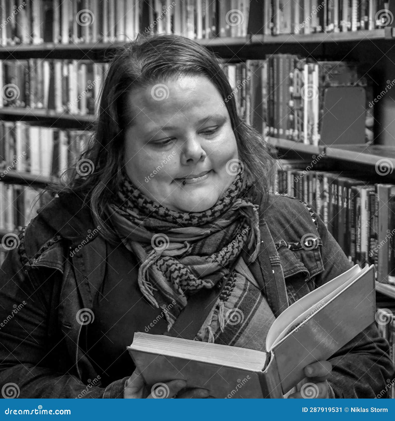 A Person Reading a Book in the Library Stock Image - Image of person ...