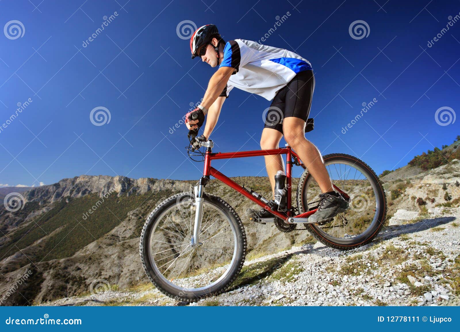 Person Riding A Bike Stock Image - Image: 12778111
