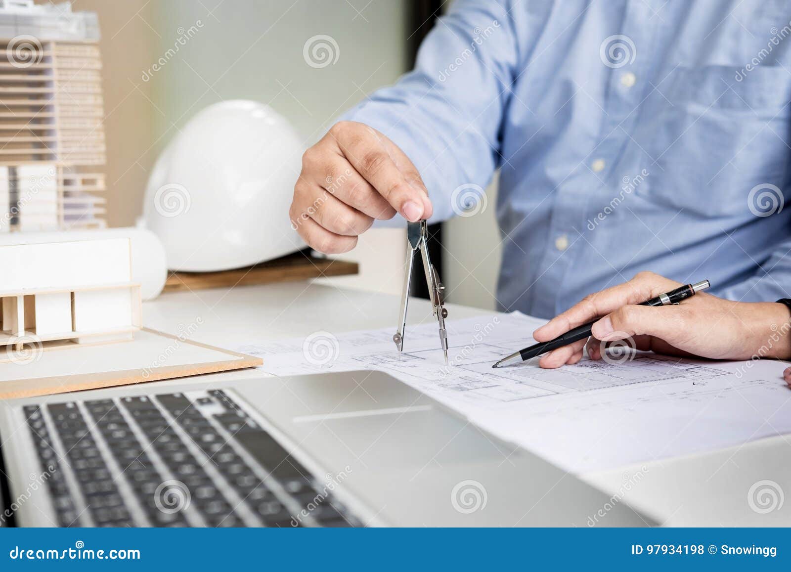 Person& X27;s Engineer Hand Drawing Plan on Blue Print with Architec ...