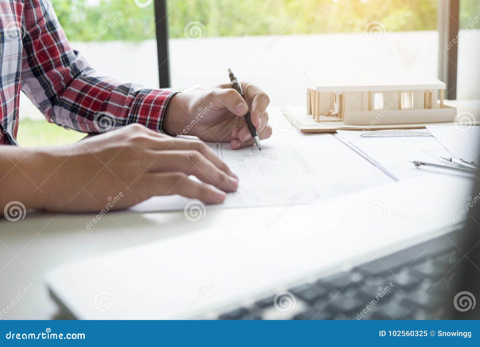 Person& X27;s Engineer Hand Drawing Plan on Blue Print or Working Pro ...