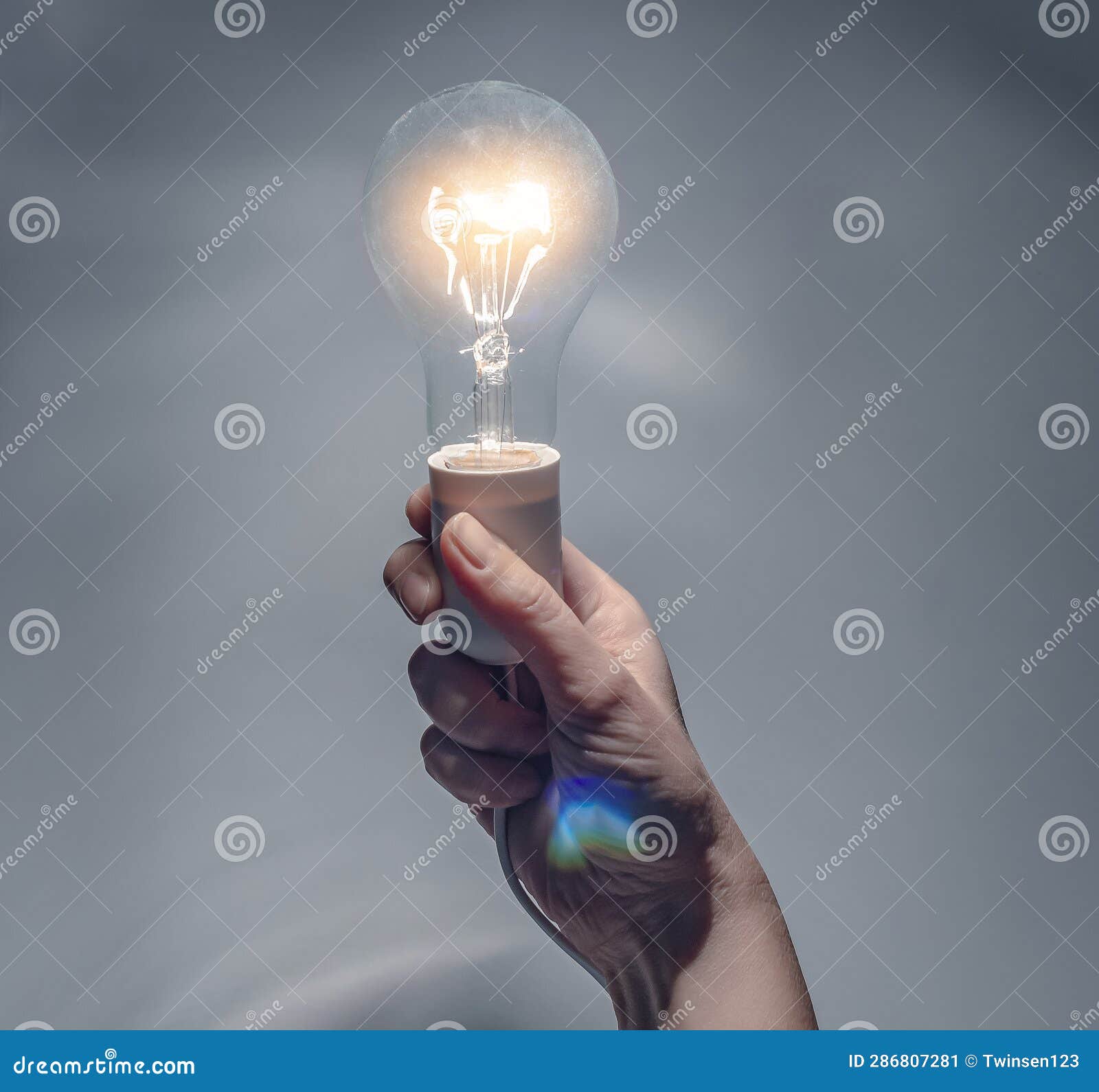 A Person S Hand Holds a Lamp. Blackout, Lighting Technologies. New Idea Stock Image - Image of ...