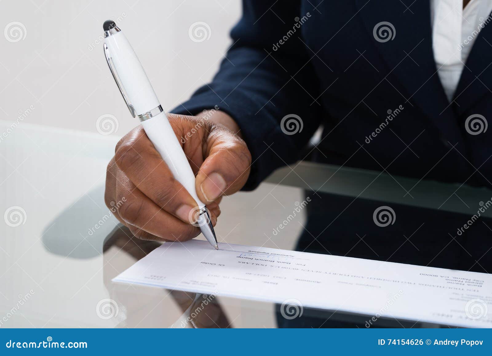 Person S Hand Signing Cheque Stock Photo - Image of holding, cheque ...