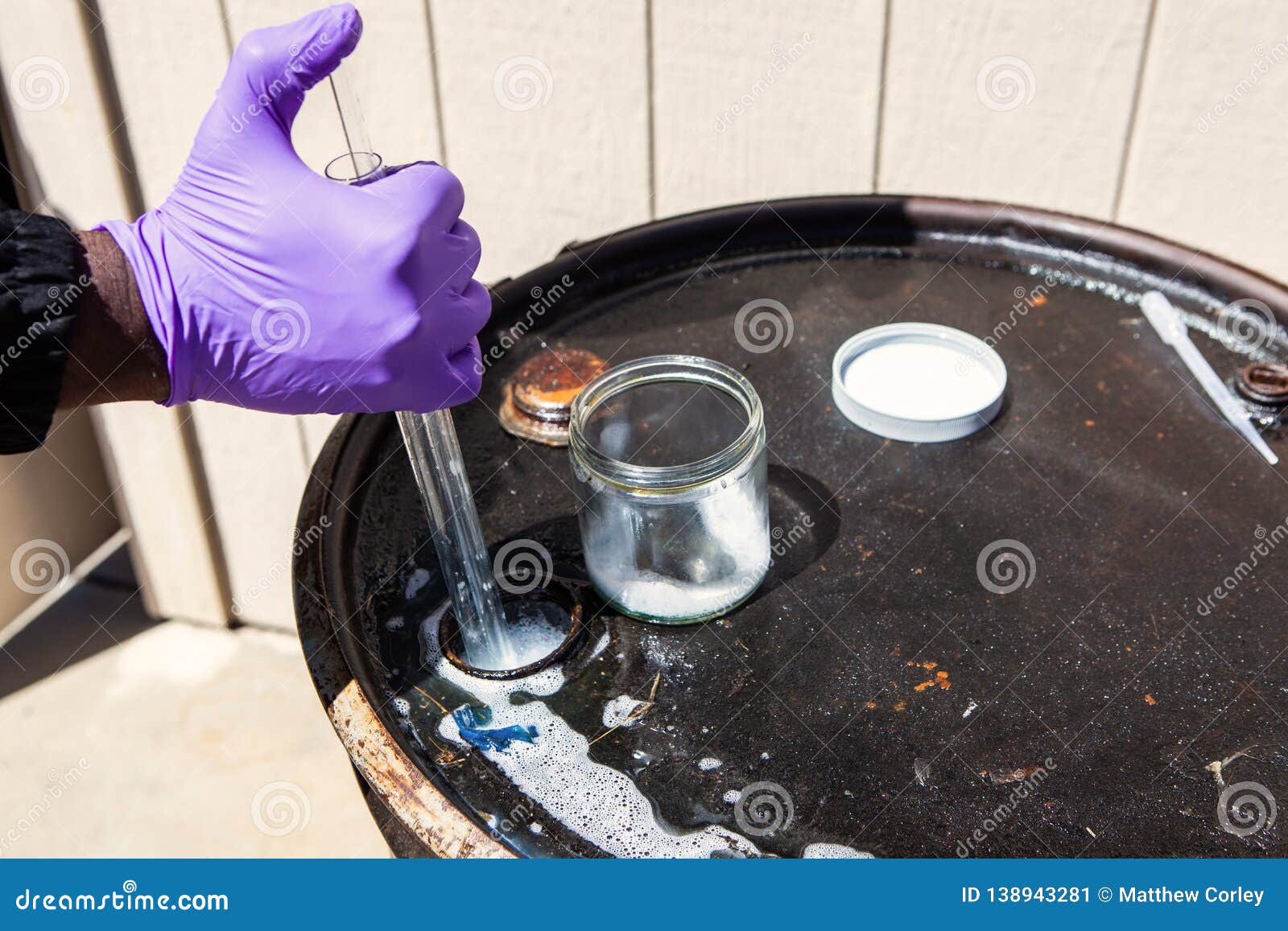 Person Sampling with Coliwasa Sampling Device Stock Image - Image of ...