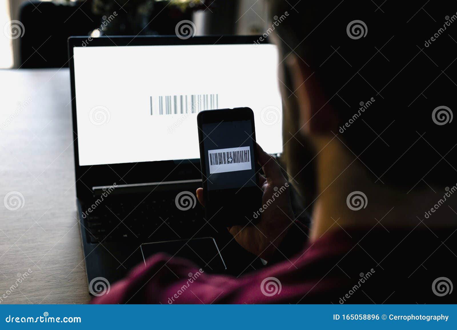 Person Scanning with Mobile Phone, Barcode on a Computer Screen, Online ...