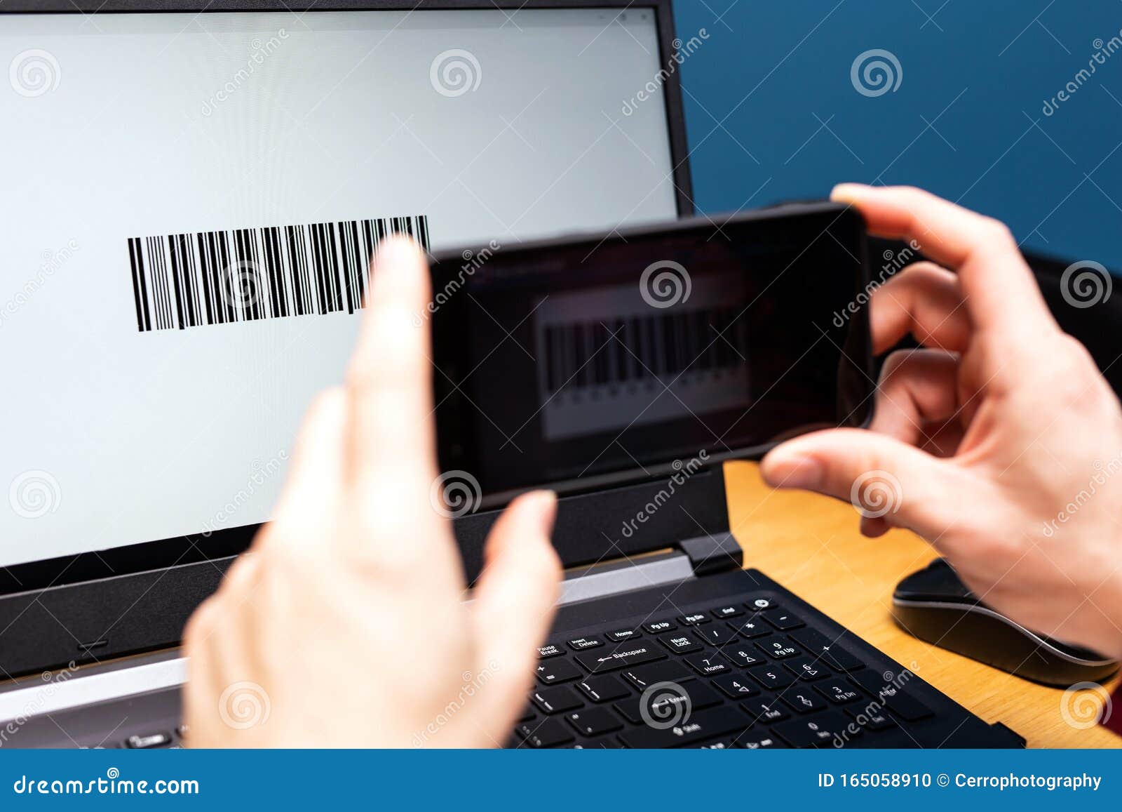 Person Scanning with Mobile Phone, Barcode on a Computer Screen, Online ...