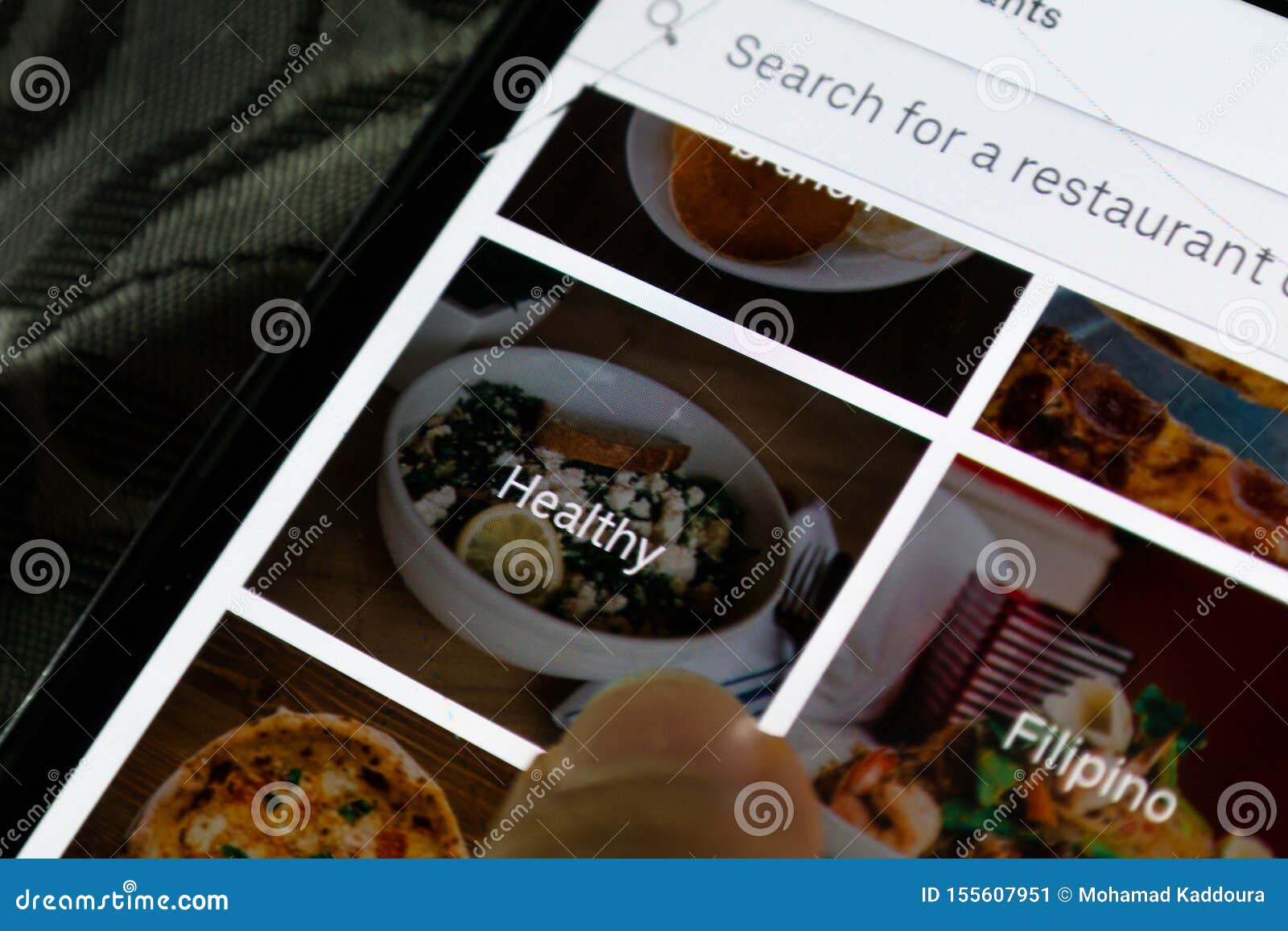 A Person Selecting Healthy Food Option while Ordering Food Online on an ...