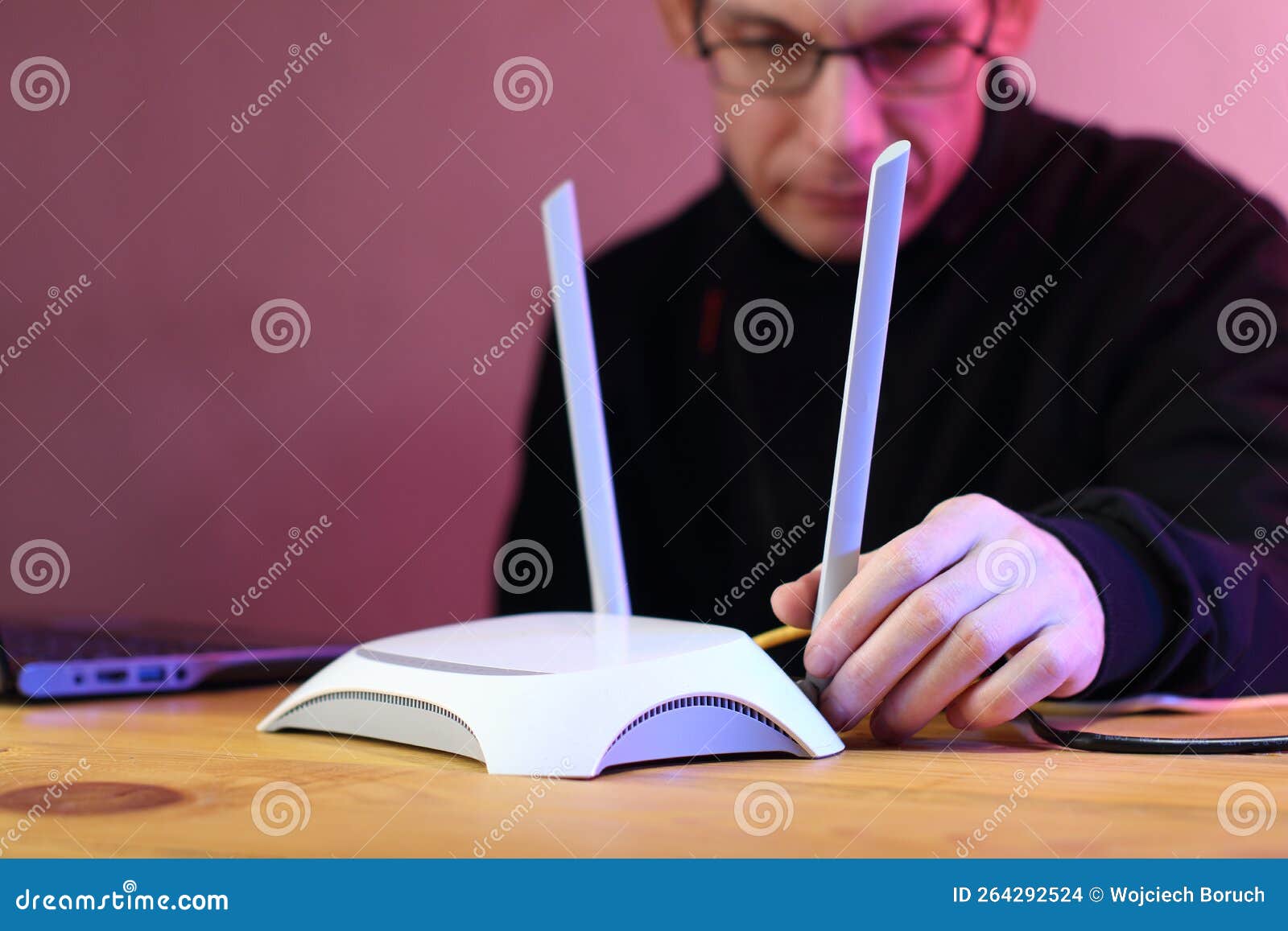Person Setting Router Antenna on Table Stock Photo - Image of setup ...