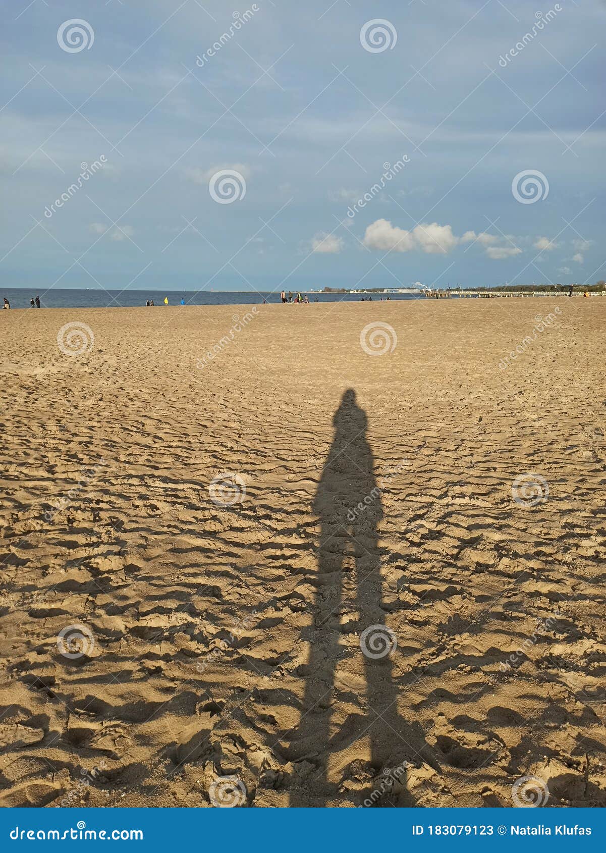 Person shadow on the beach stock image. Image of iron - 183079123