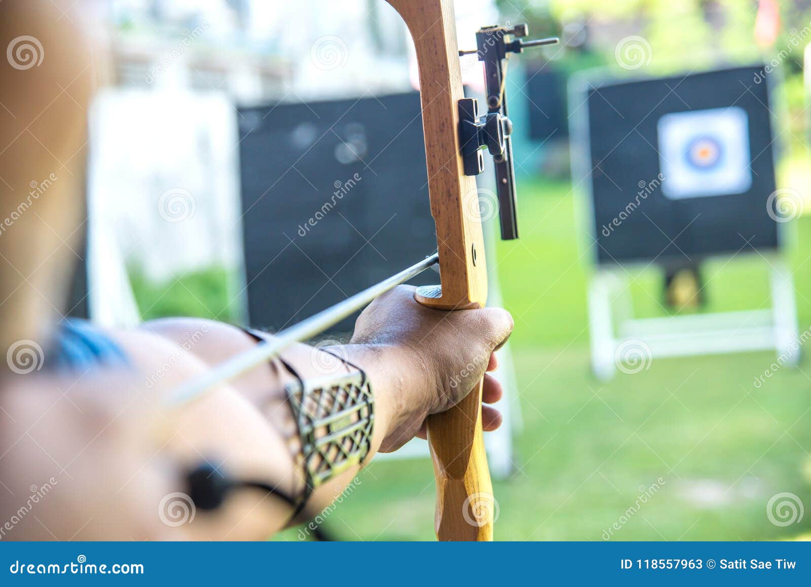 Man Shooting with Bow on a Target during an Archery. Stock Image ...