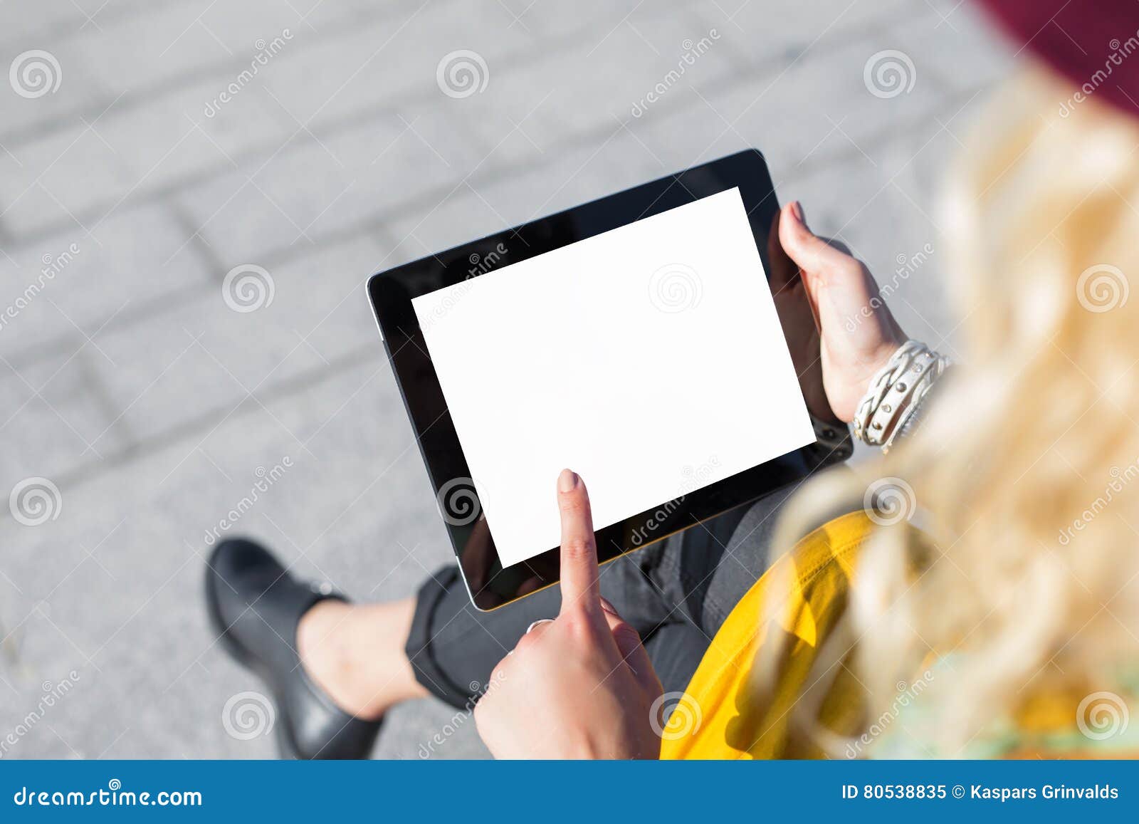 Person Sitting Outside and Using Blank Screen Tablet Stock Image ...