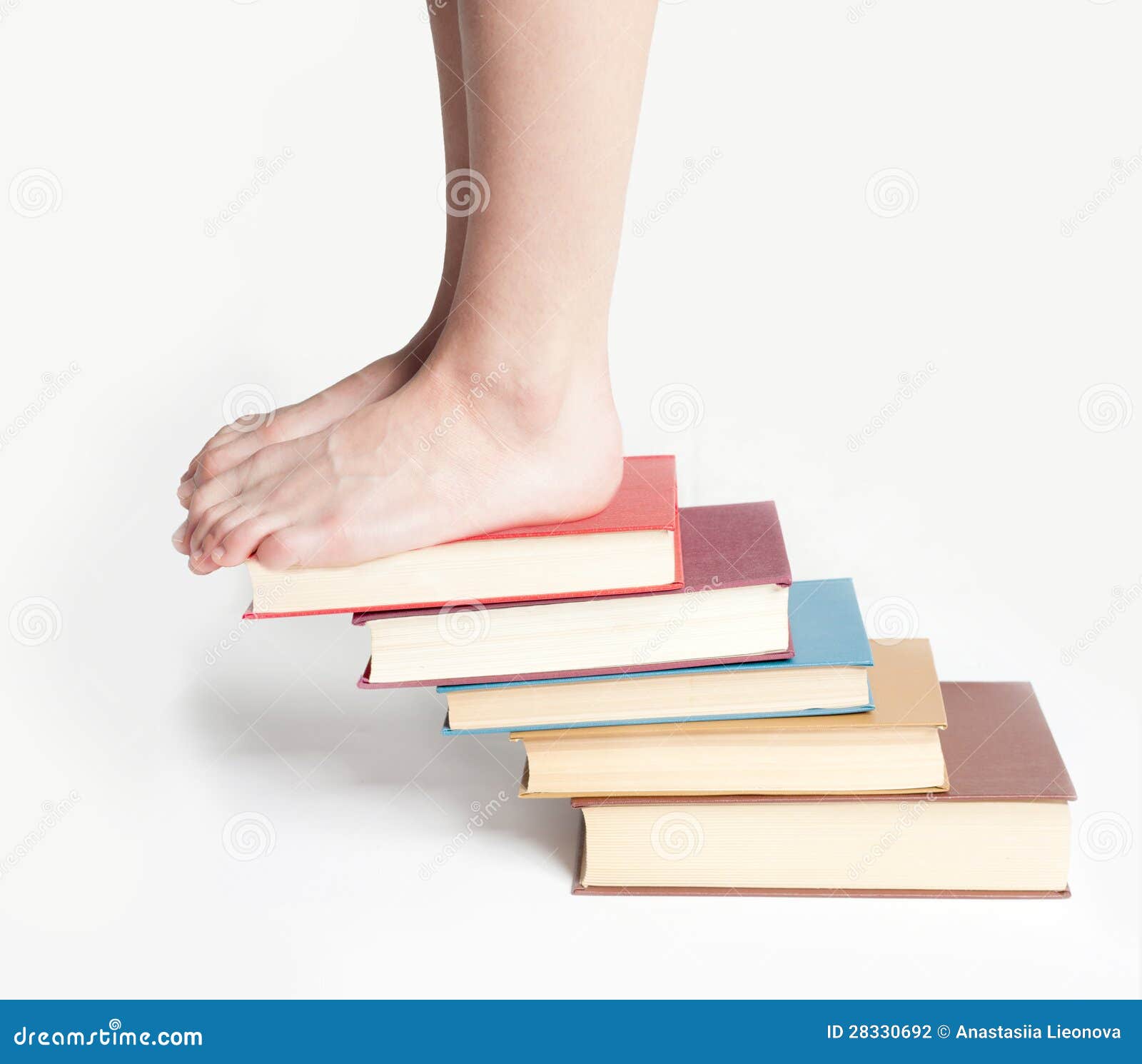 Person standing on books stock photo. Image of concept - 28330692