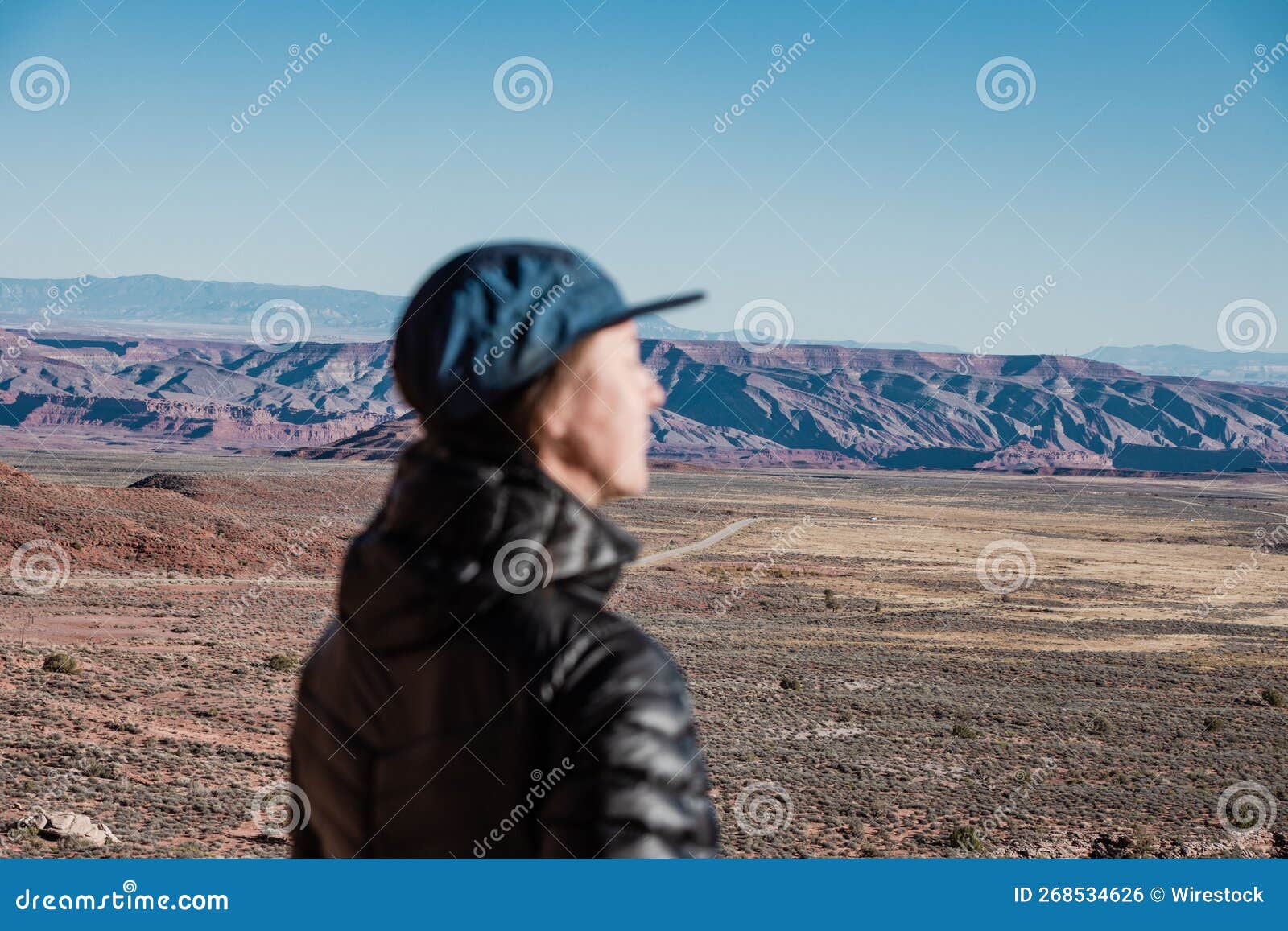 Person Standing in Front of Field with Hills Stock Photo - Image of ...