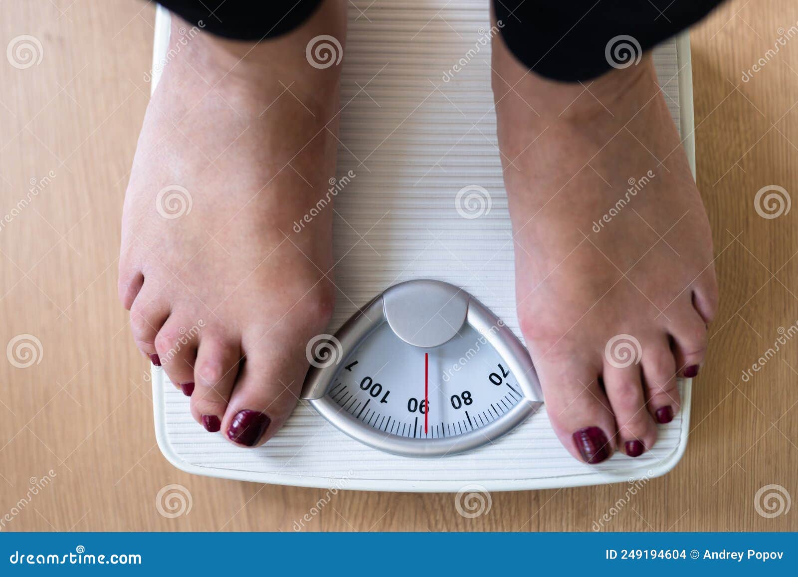 Person Standing on Weighing Scale Stock Photo - Image of jean, accuracy ...