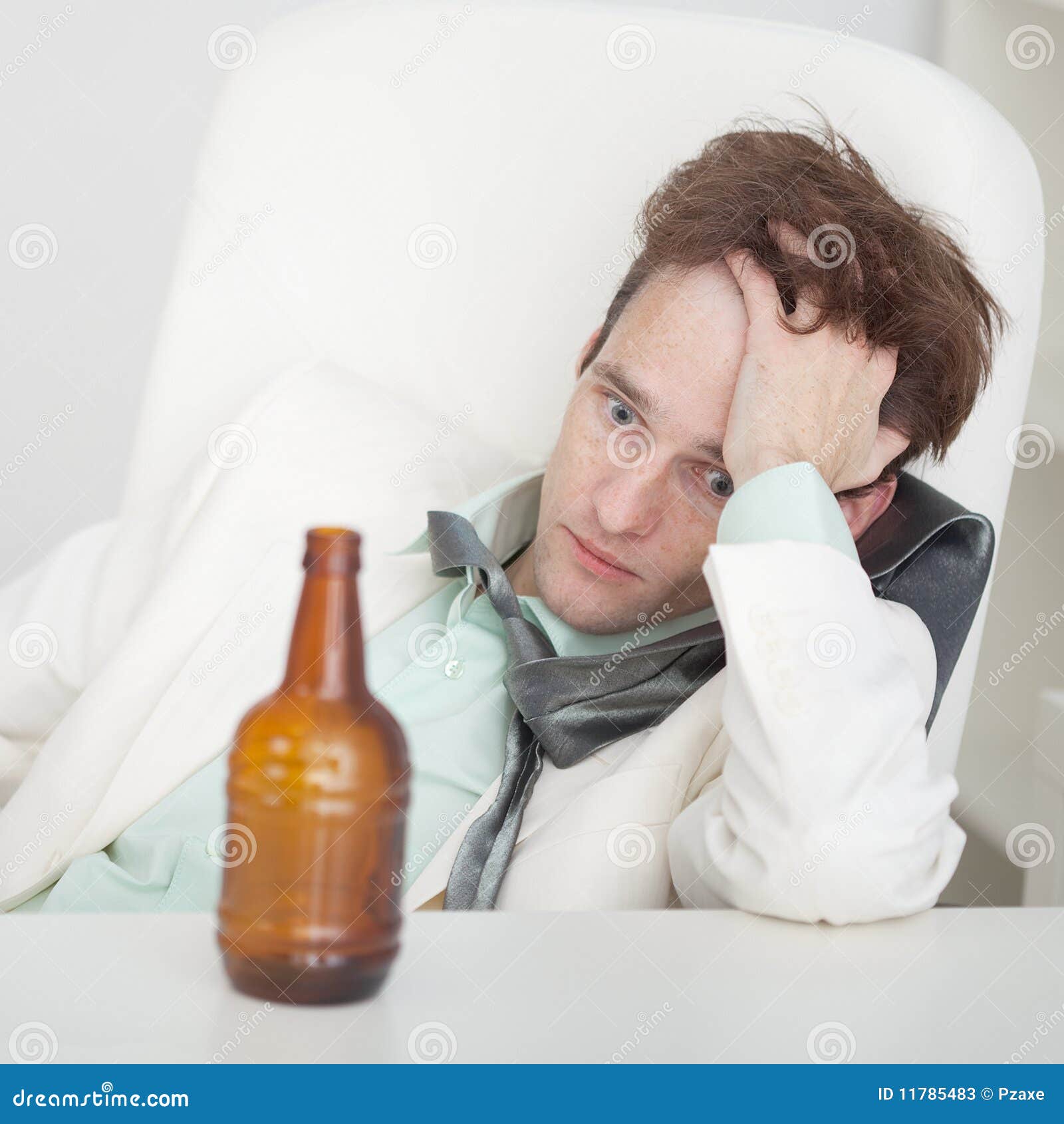 Person Suffers from Hangover Sitting at a Table Stock Image - Image of ...
