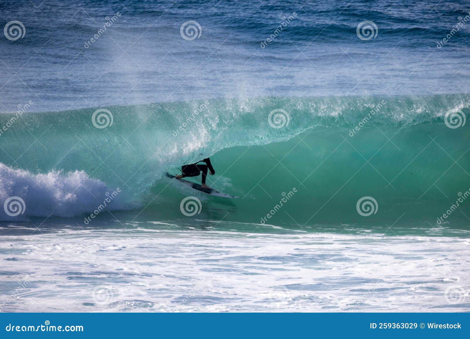Person Surfing a Wave Tunnel in the Ocean. Stock Image - Image of ...