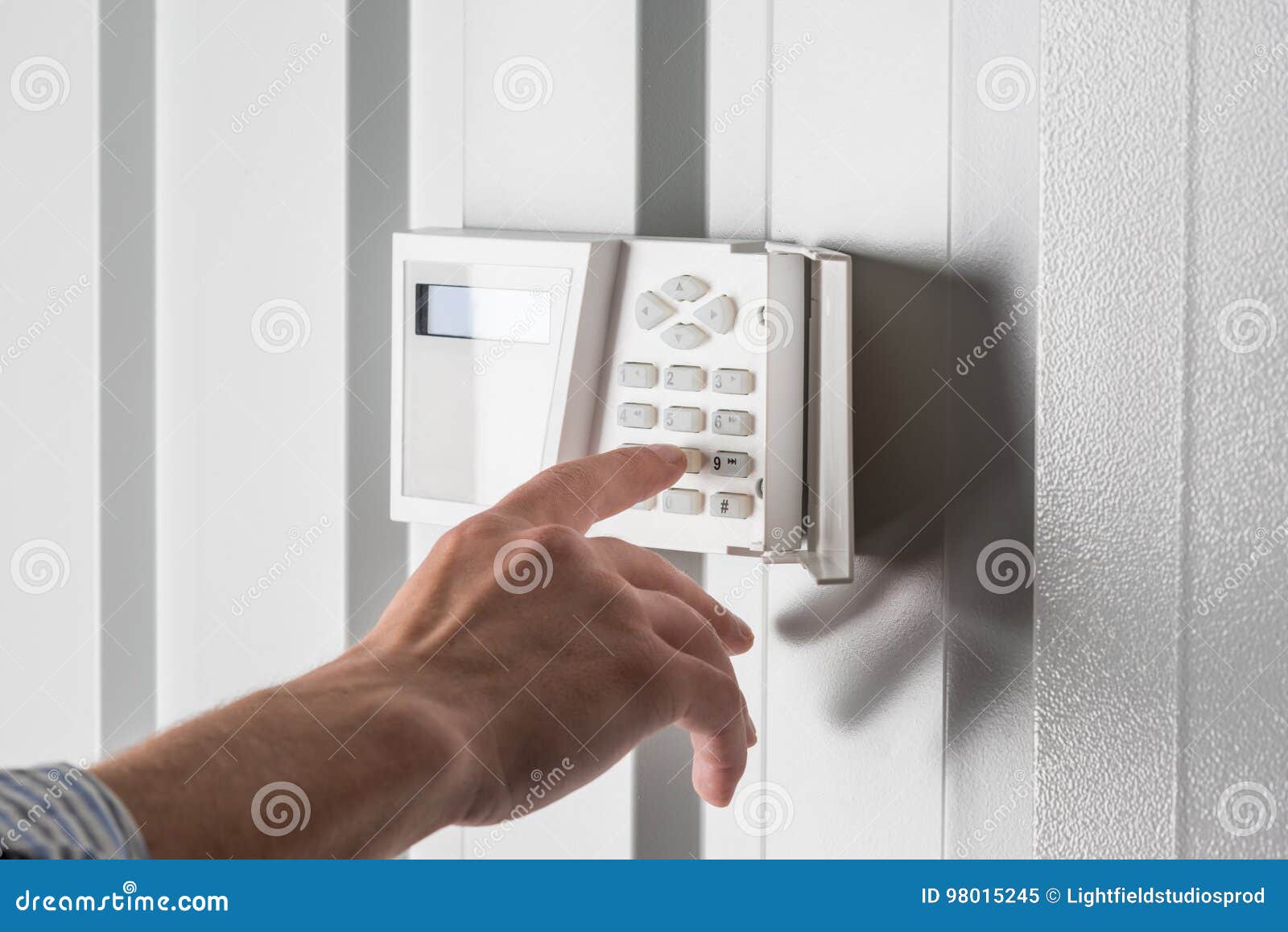 Person Typing on Keypad of Home Security Alarm Stock Image - Image of ...