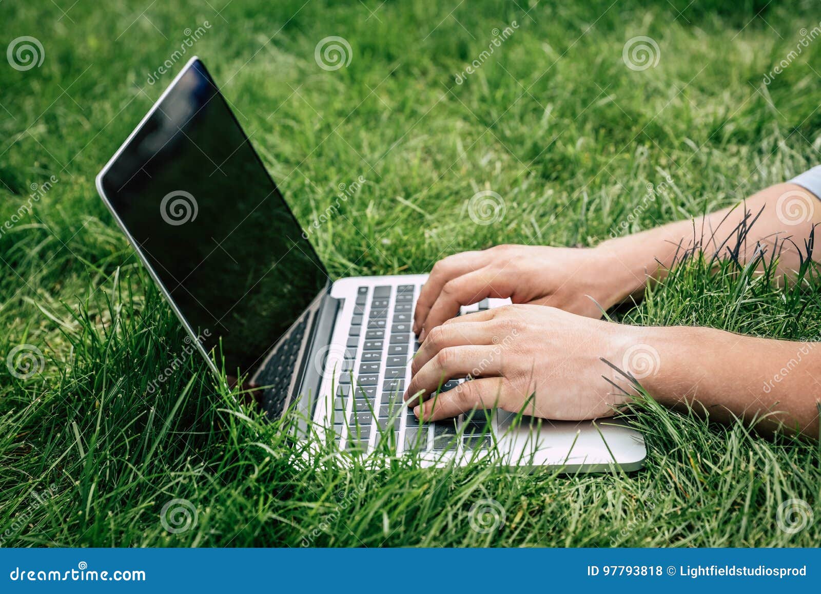 Person Typing on Laptop with Blank Screen Outdoors Stock Photo - Image ...
